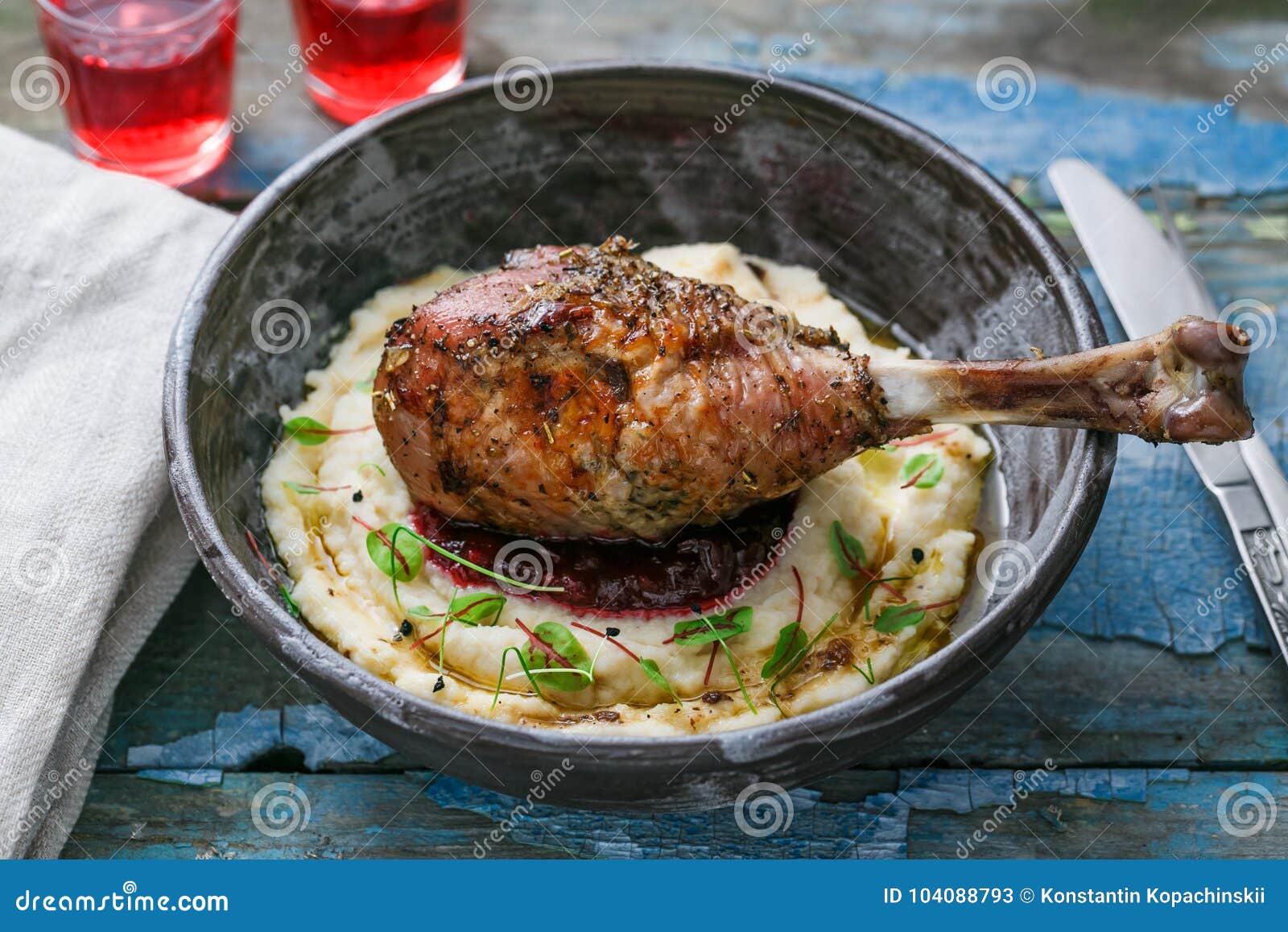 Dinner with Baked Turkey Leg with Cranberry Sauce on Mashed Celery Root ...