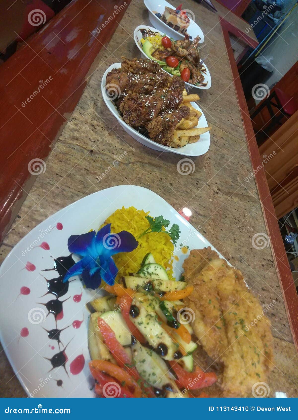 Dinner at the bar stock photo. Image of served, restaurant - 113143410