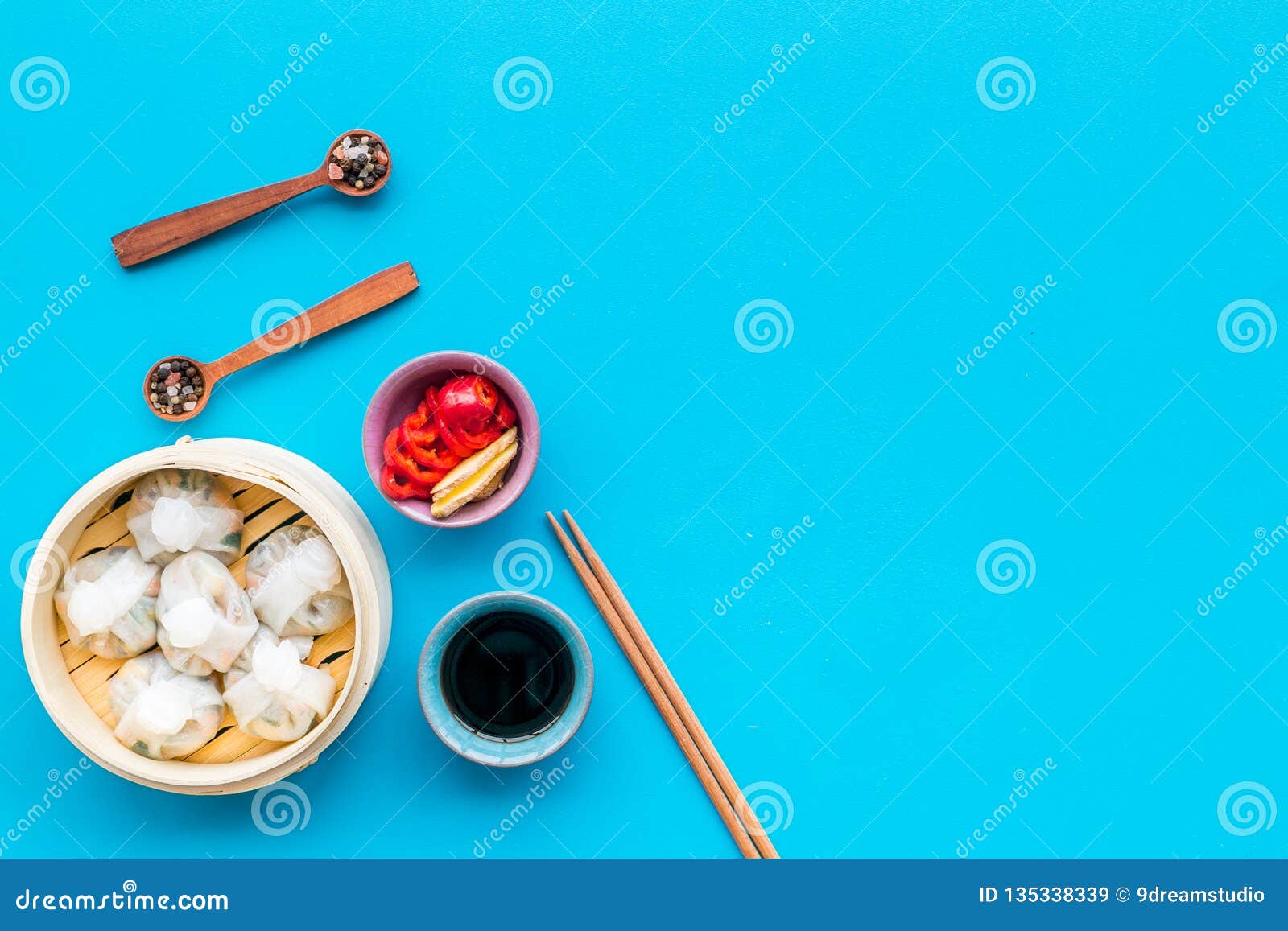 Dinner in Chinese Restaurant with Dim Sum, Sticks, Spices and Tea on ...