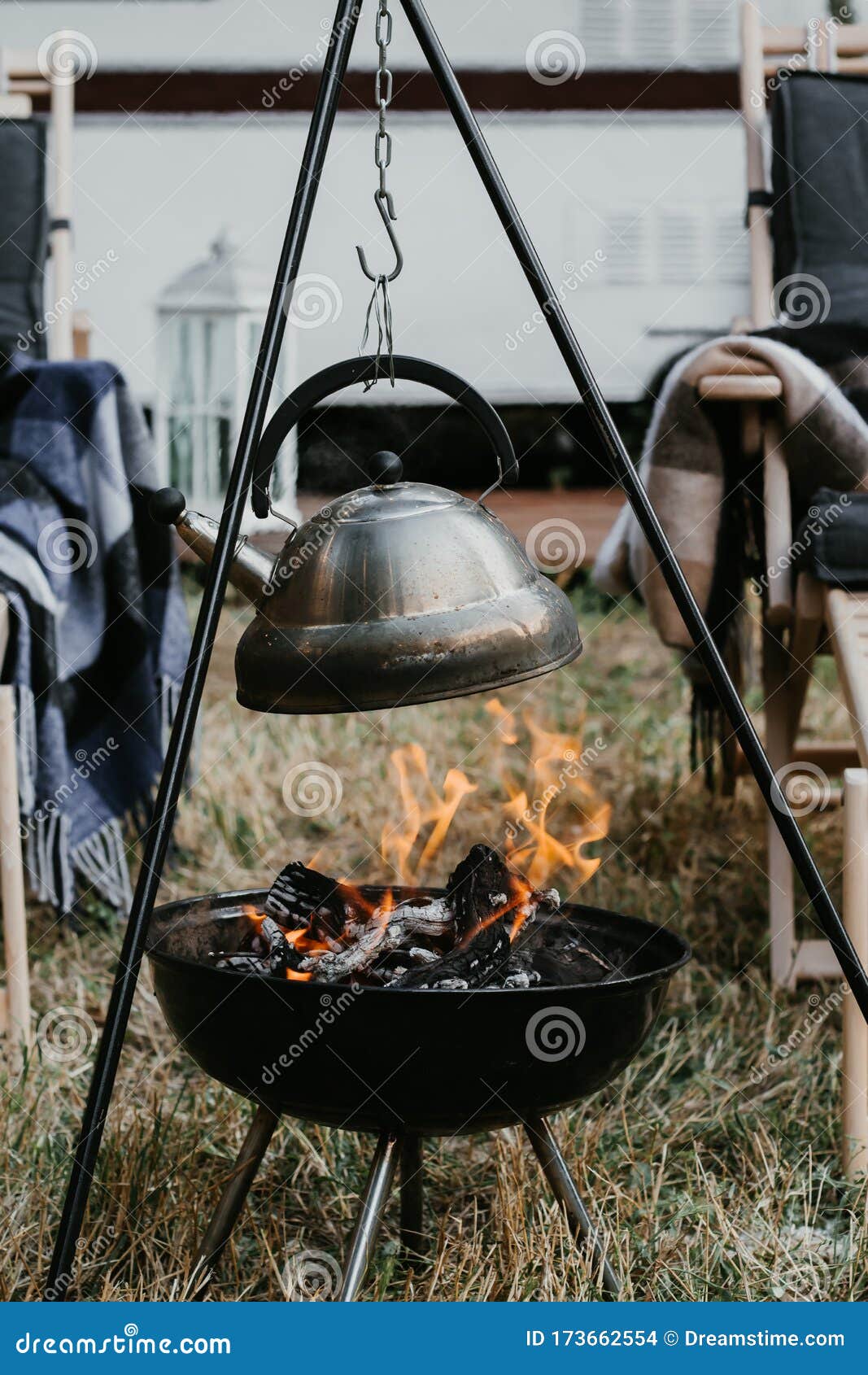Dinner Cooks in a Large Pot Over an Open Fire Stock Photo - Image of ...