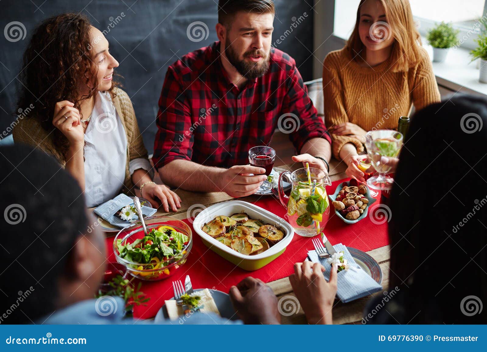 Dinner of friends stock photo. Image of salad, napkin - 69776390