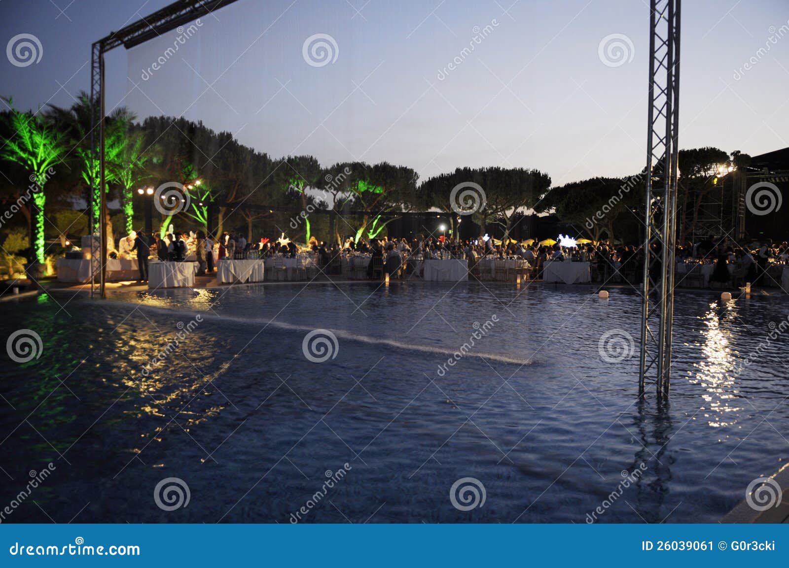 Dinner Party by the Pool at Sunset Stock Image - Image of guests ...
