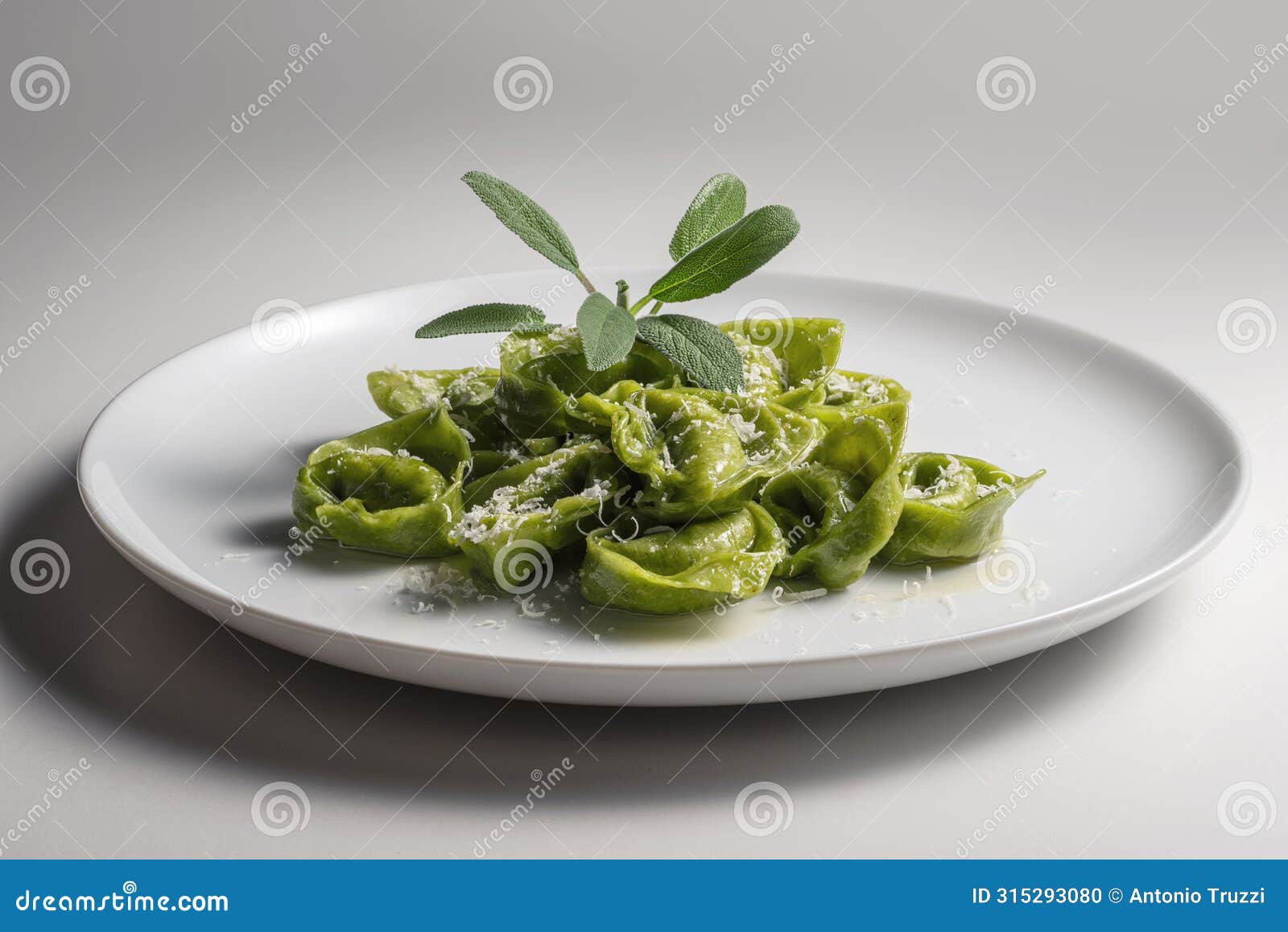 Dinner Plate of Green Ravioli with Sage and Parmesan Stock Photo ...