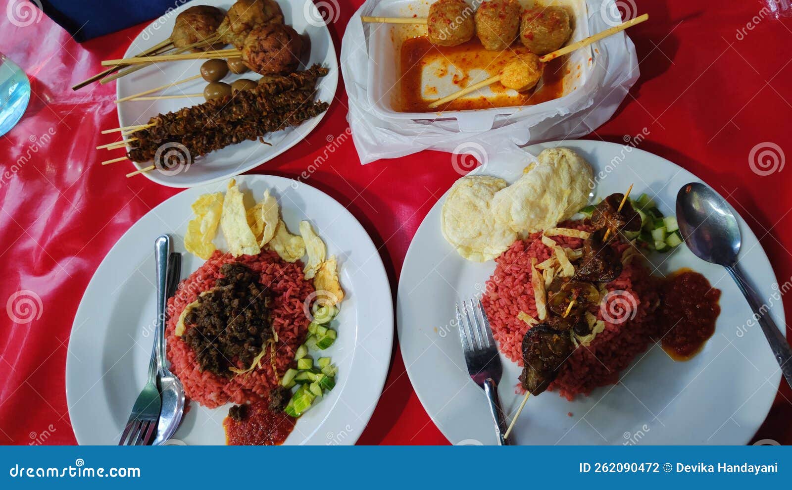 Dinner of Red Fried Rice with Spicy Satay Stock Photo - Image of ...