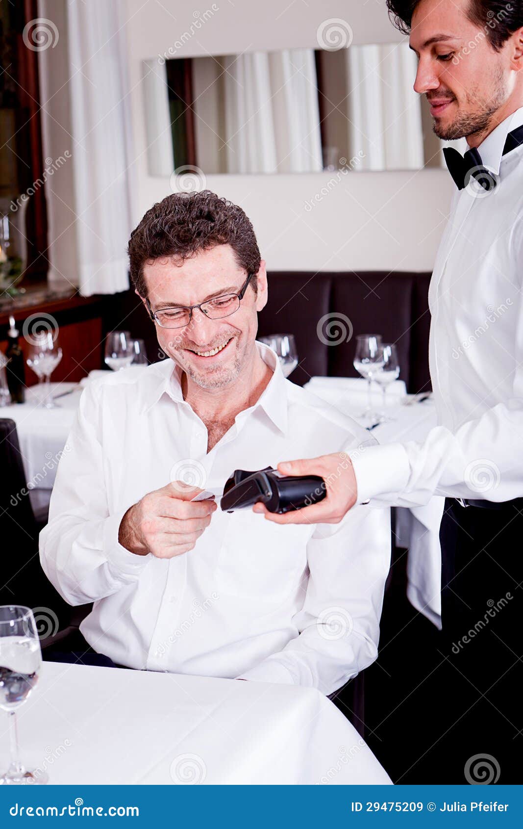 Dinner in Restaurant Man and Woman Pay by Credit Card Stock Image ...