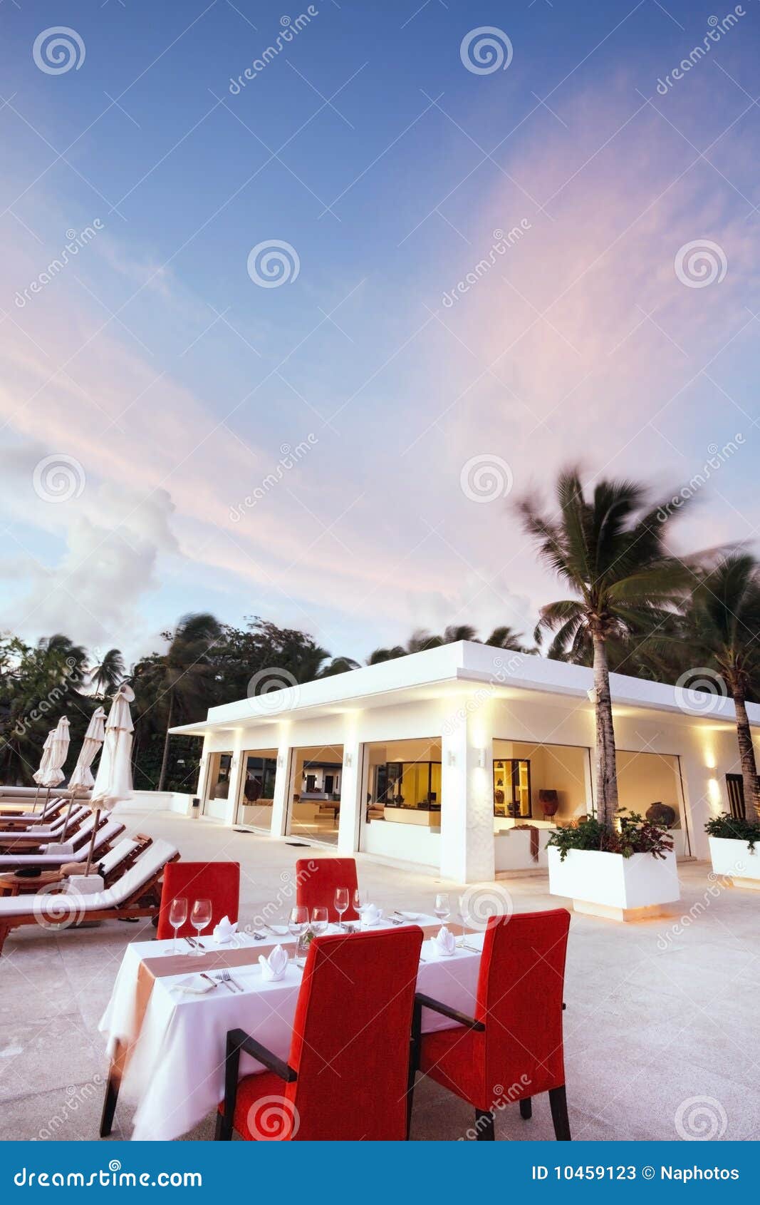 Dinner at Restaurant and Swimming Pool Stock Image - Image of deckchair ...
