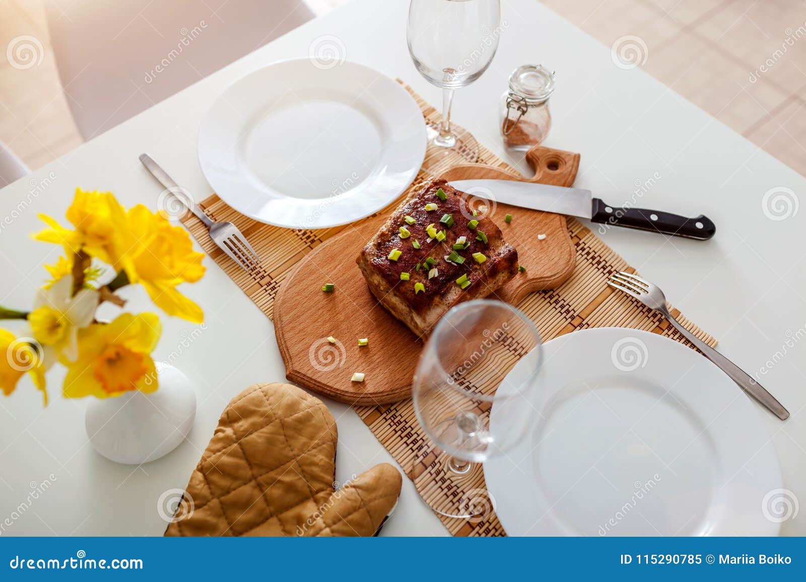 Dinner Setting for Two Served in Kitchen. Roasted Meat with Wine in ...