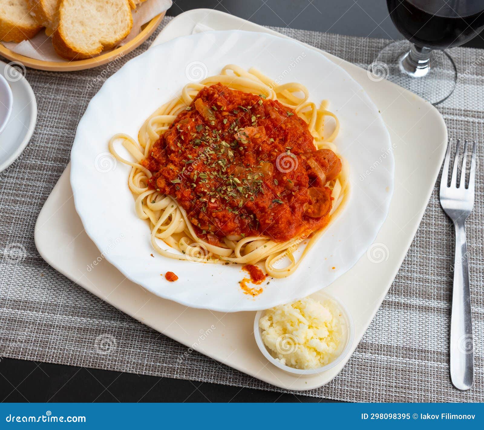 Dinner on Table - Delicious Spaghetti with Sausage and Sauce Stock ...