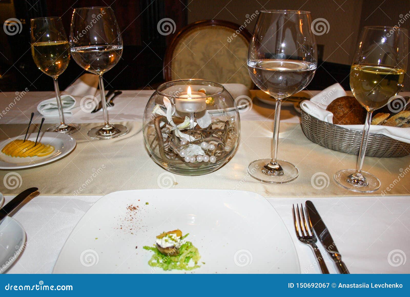 Dinner on the Table in the Evening in a Restaurant Stock Image - Image ...