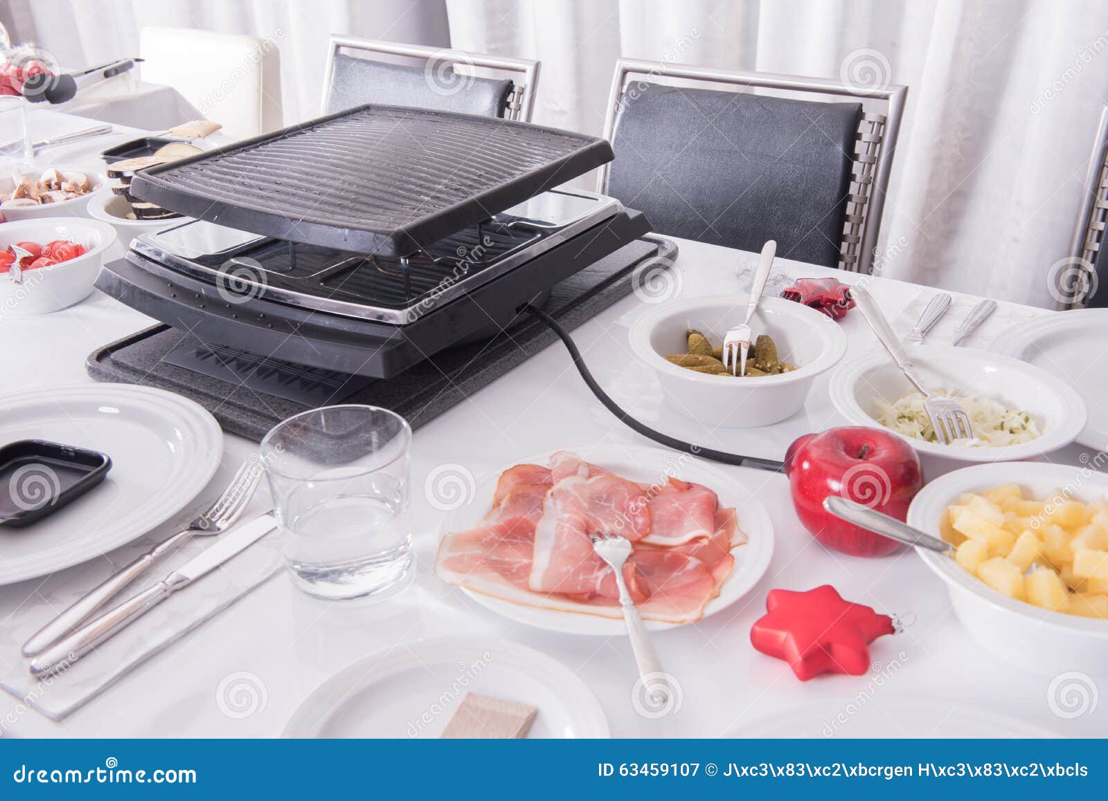 Dinner Table Prepared for Raclette with Friends with Decoration Stock ...
