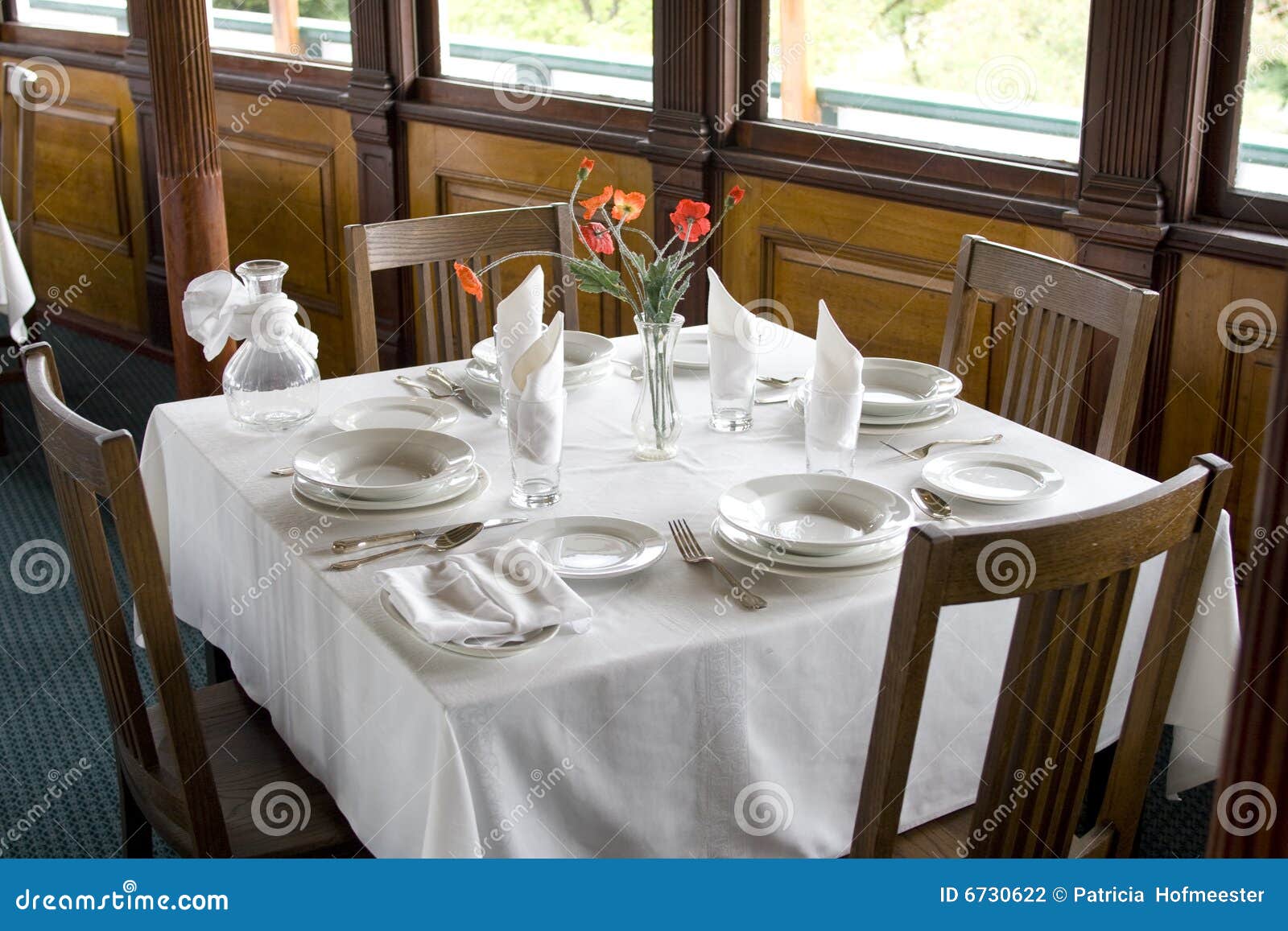 Dinner table in restaurant stock photo. Image of flatware - 6730622