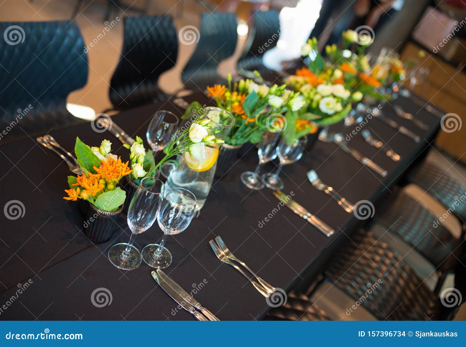 Dinner Table Setting with Flowers Stock Photo - Image of closeup ...