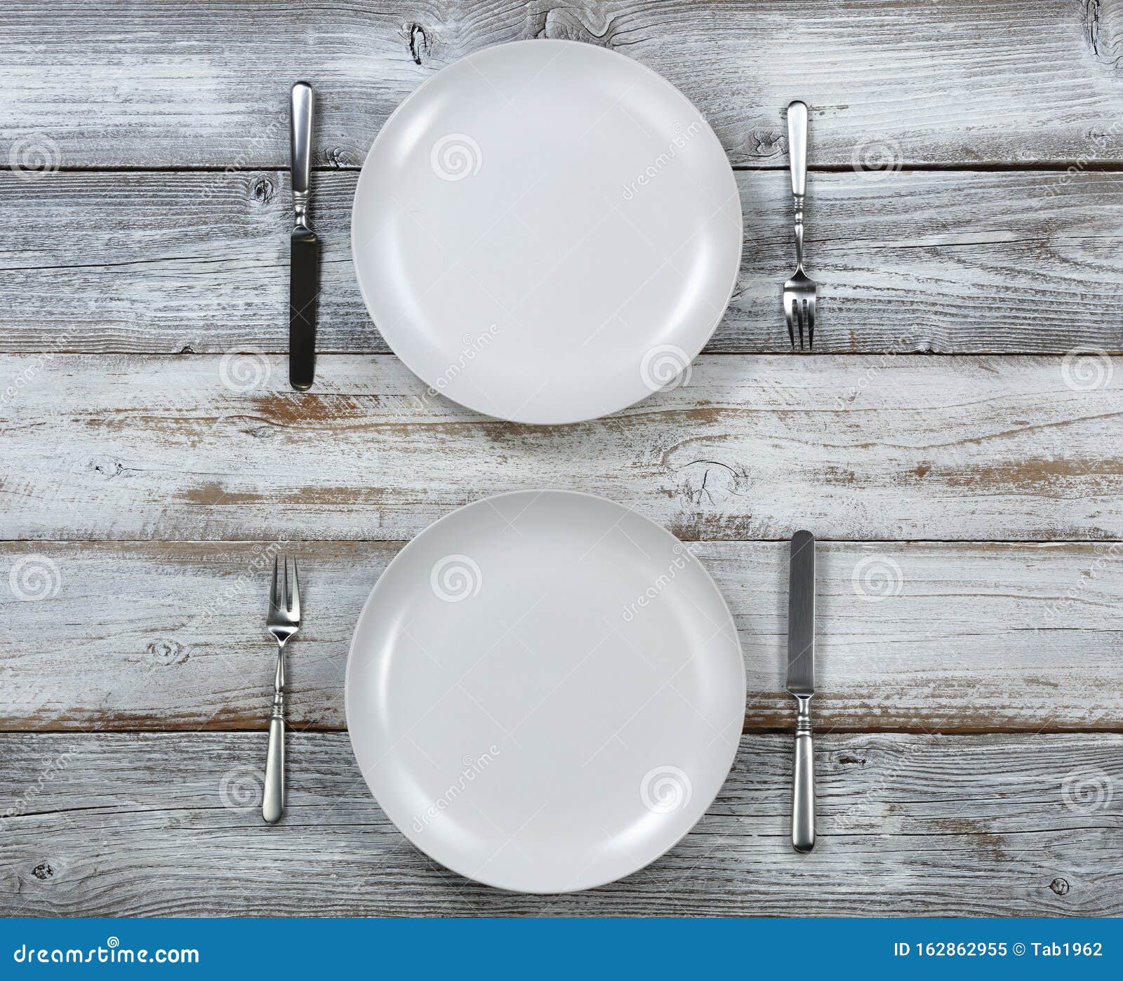 Dinner Table Setting on White Rustic Wood in Overhead View Stock Image ...