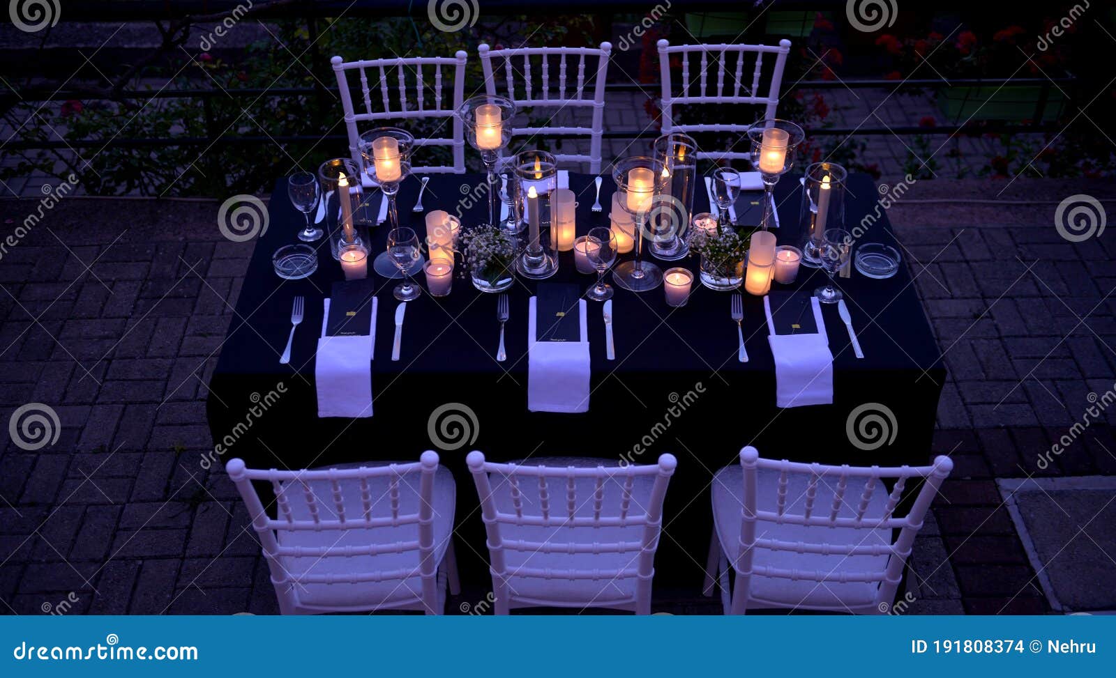 Dinner Table with Candles at a Wedding by Night Stock Photo - Image of ...