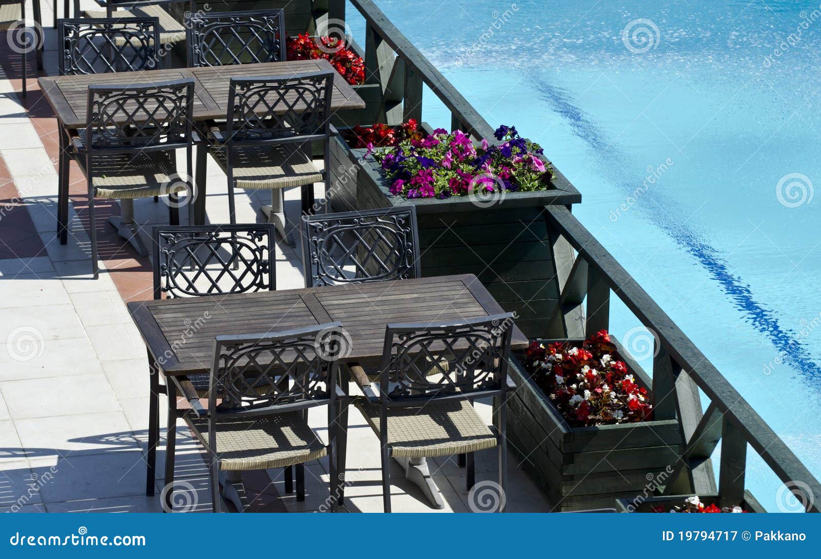 Dinner tables near pool stock image. Image of hotel, outdoor - 19794717
