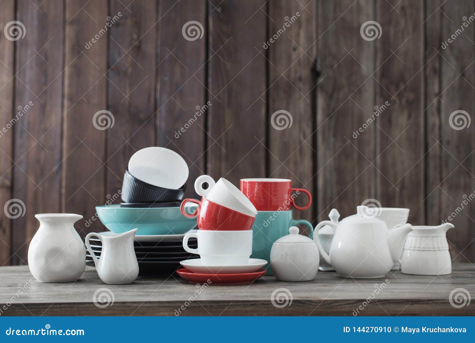 Dinnerware on Wooden Background in Kitchen Stock Photo - Image of ...