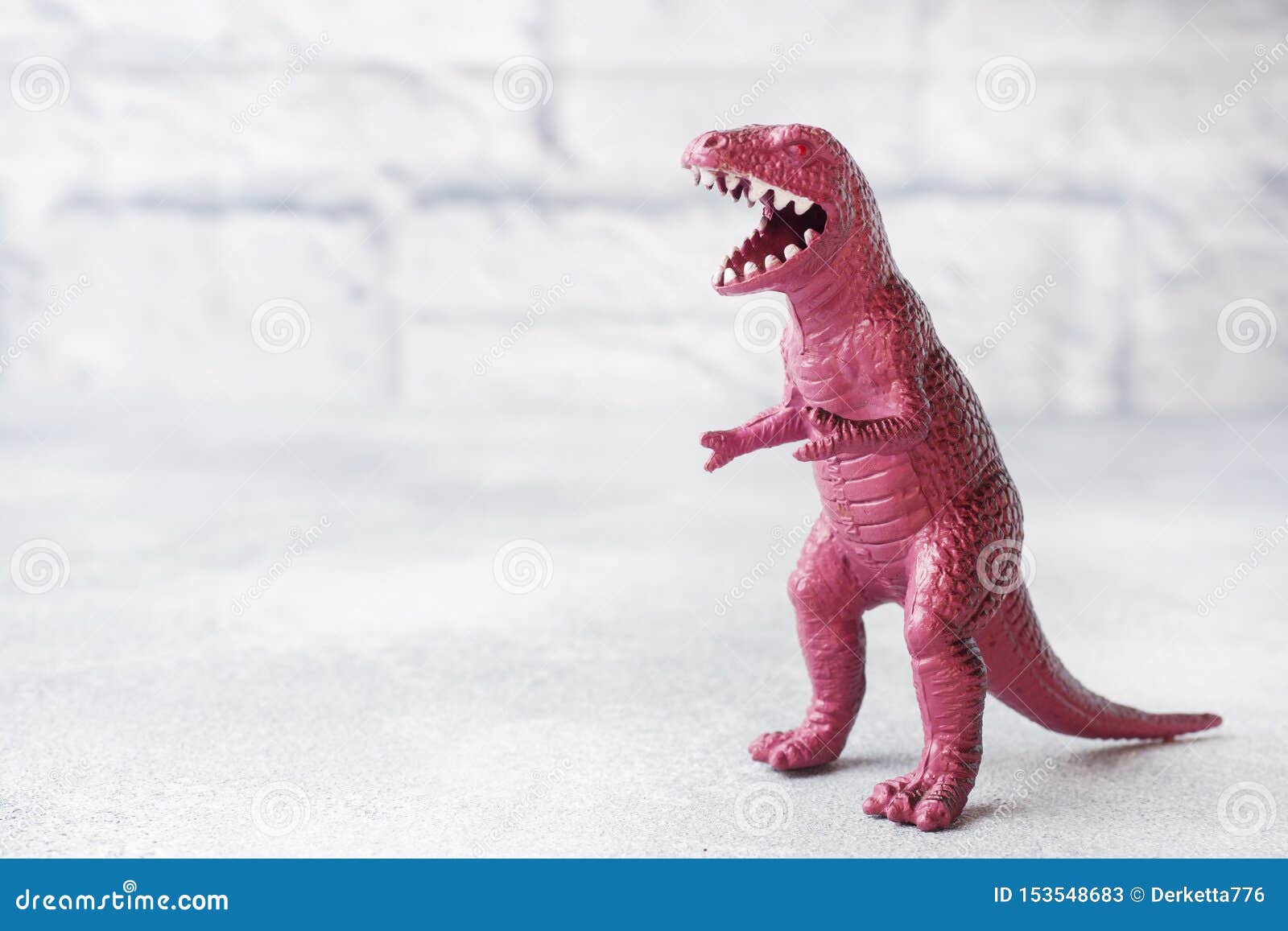 Dinosaur on a Gray Background. Plastic Rubber Toy Stock Image - Image ...