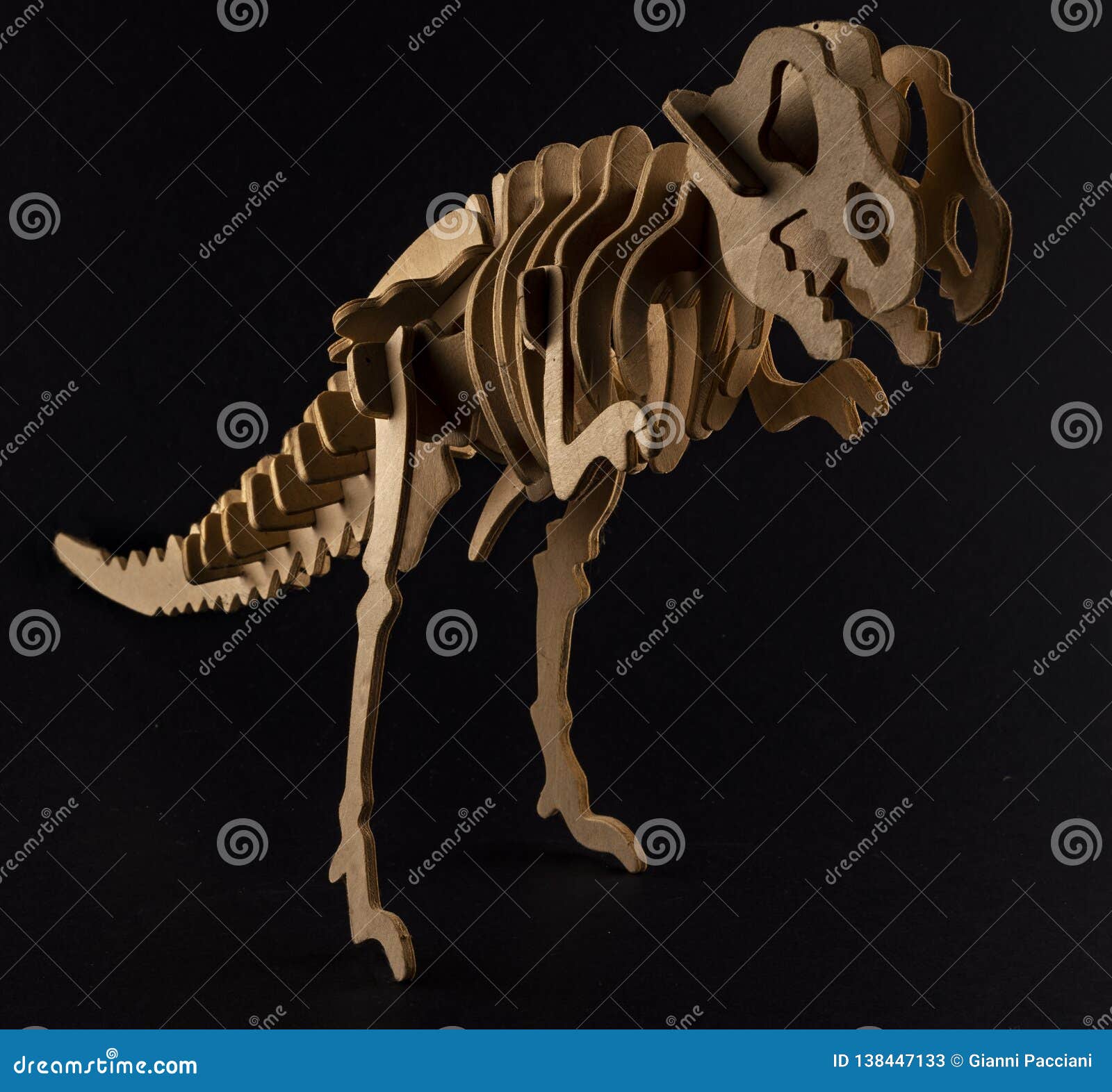 Dinosaur skeleton ornament stock image. Image of wood - 138447133