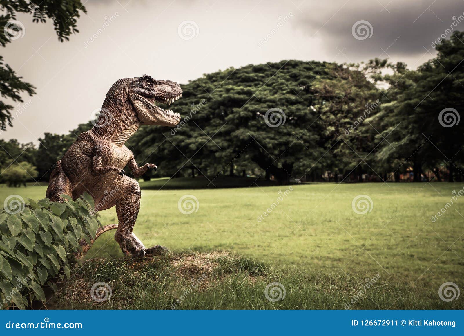 Dinosaur , T-rex with Tree Branches Against on the Nature Stock Image ...