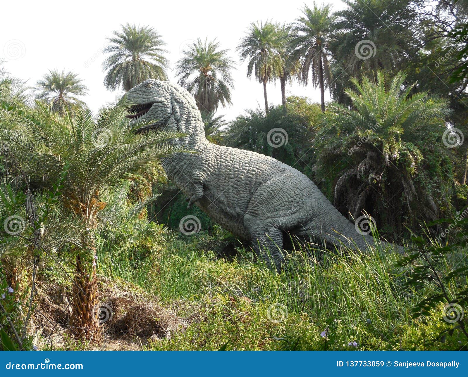 Dinosaur in the zoo stock image. Image of trees, greenery - 137733059