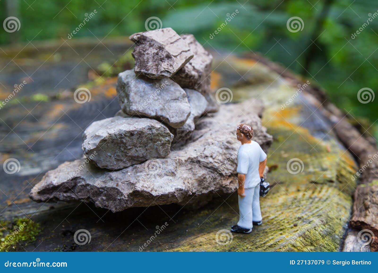Diorama of man and rocks stock image. Image of large - 27137079
