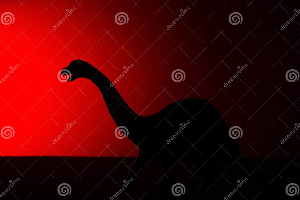 Diplodocus Shadow with Red Light Stock Photo - Image of dark ...