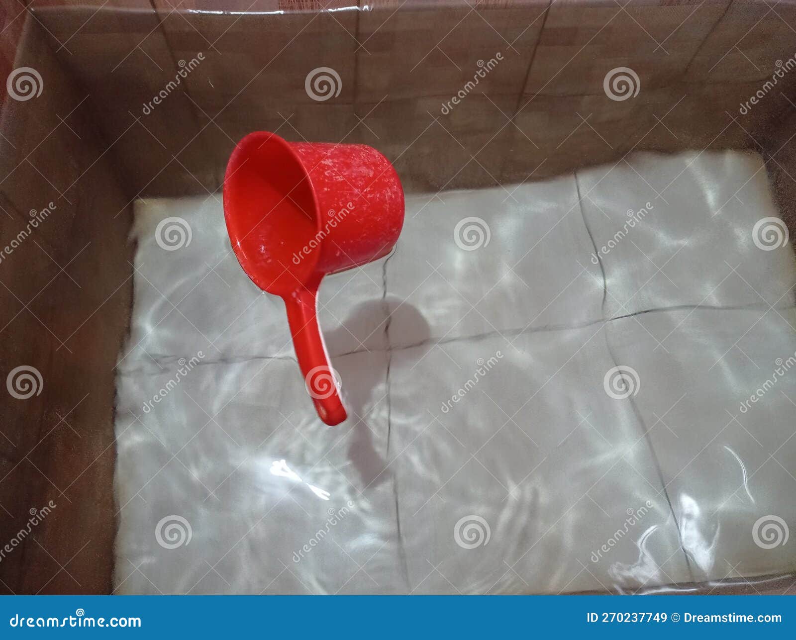 Dipper in the bath stock image. Image of reflection - 270237749