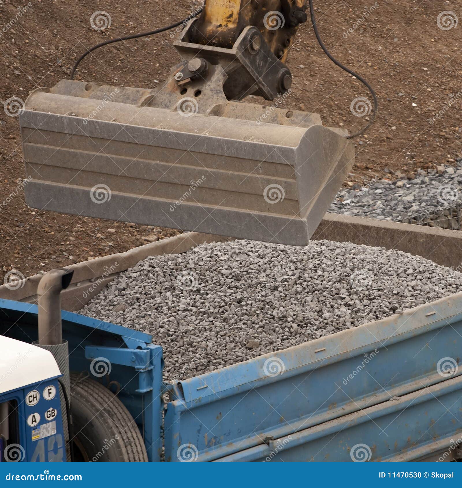 Dipper working with gravel stock photo. Image of pour - 11470530