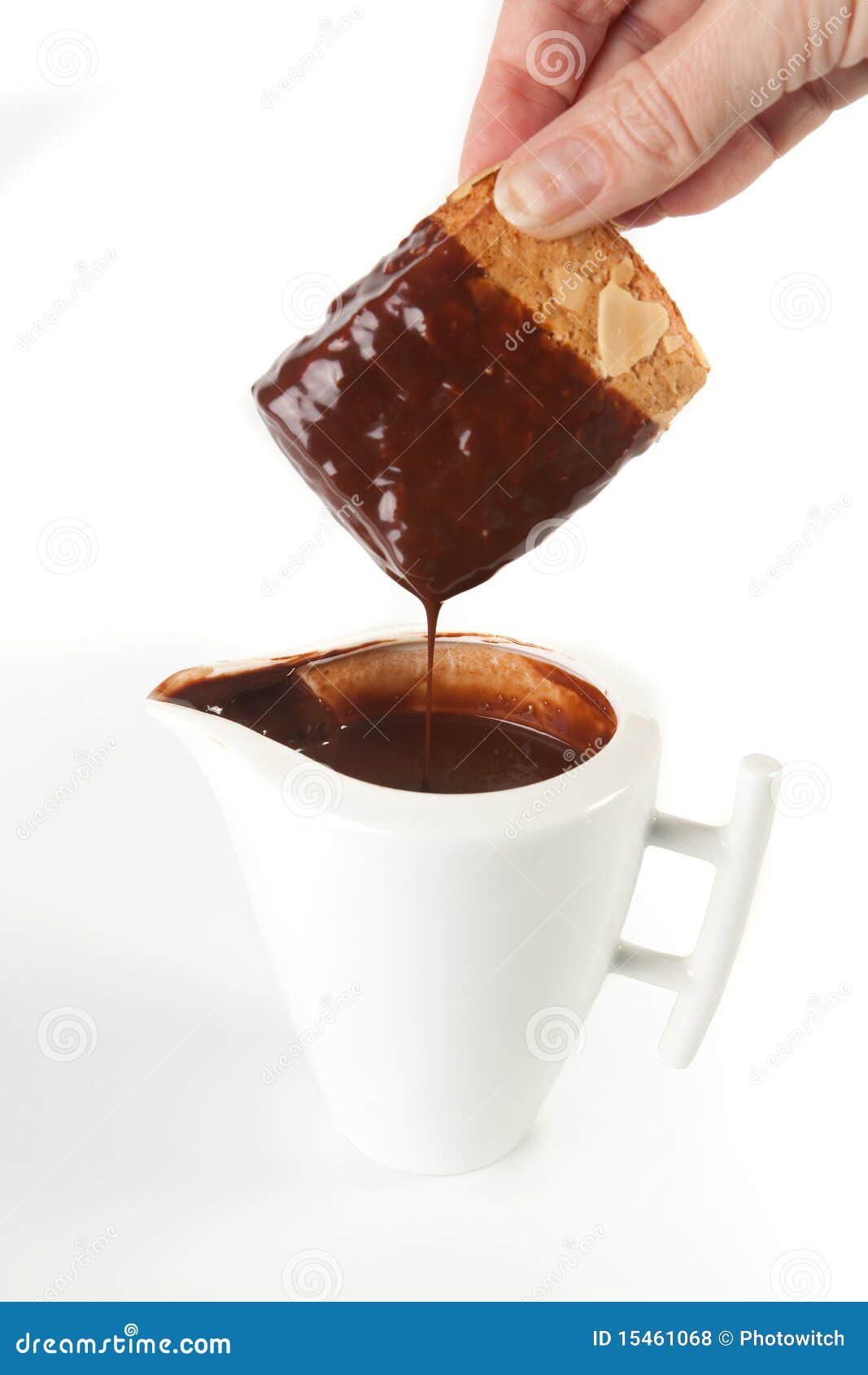 Dipping chocolate stock photo. Image of hand, fluid, chocolate - 15461068