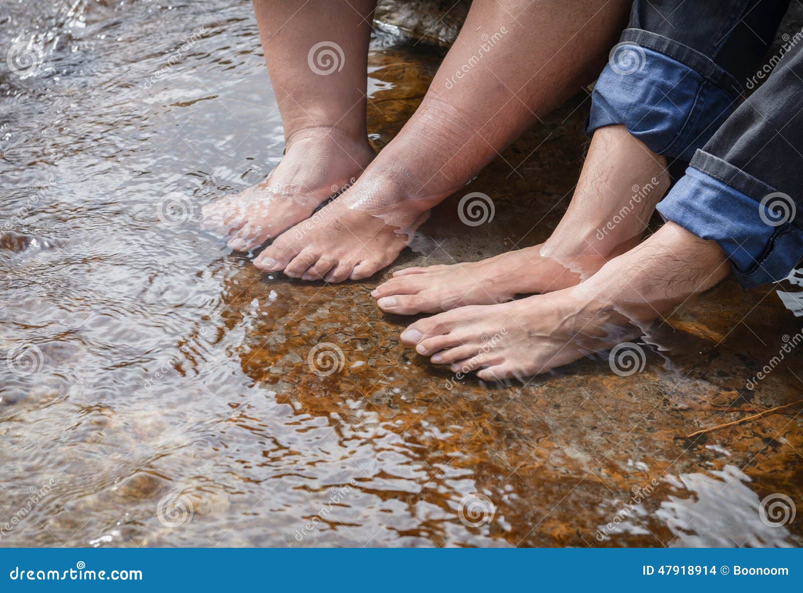 Dipping feet in water stock photo. Image of happiness - 47918914