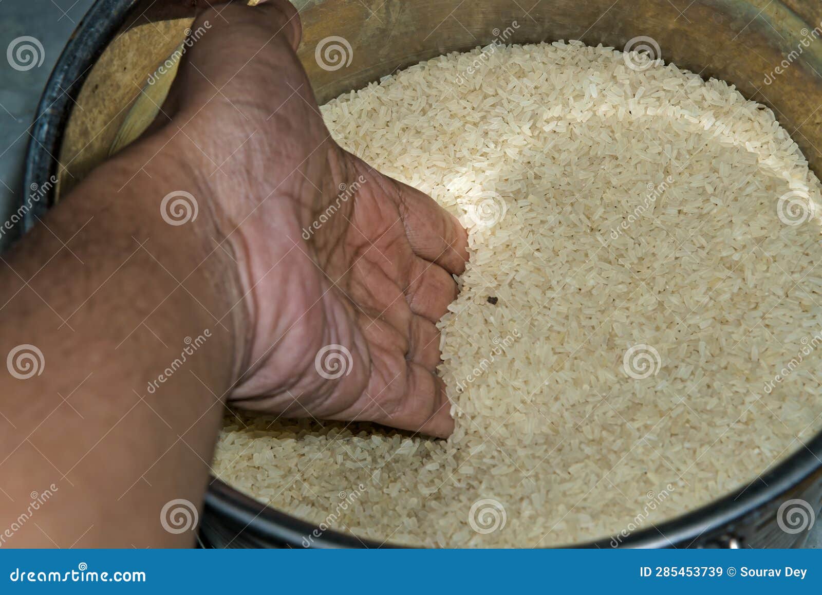 Dipping Fingers in a Bucket of Basmati Rice Stock Image - Image of ...