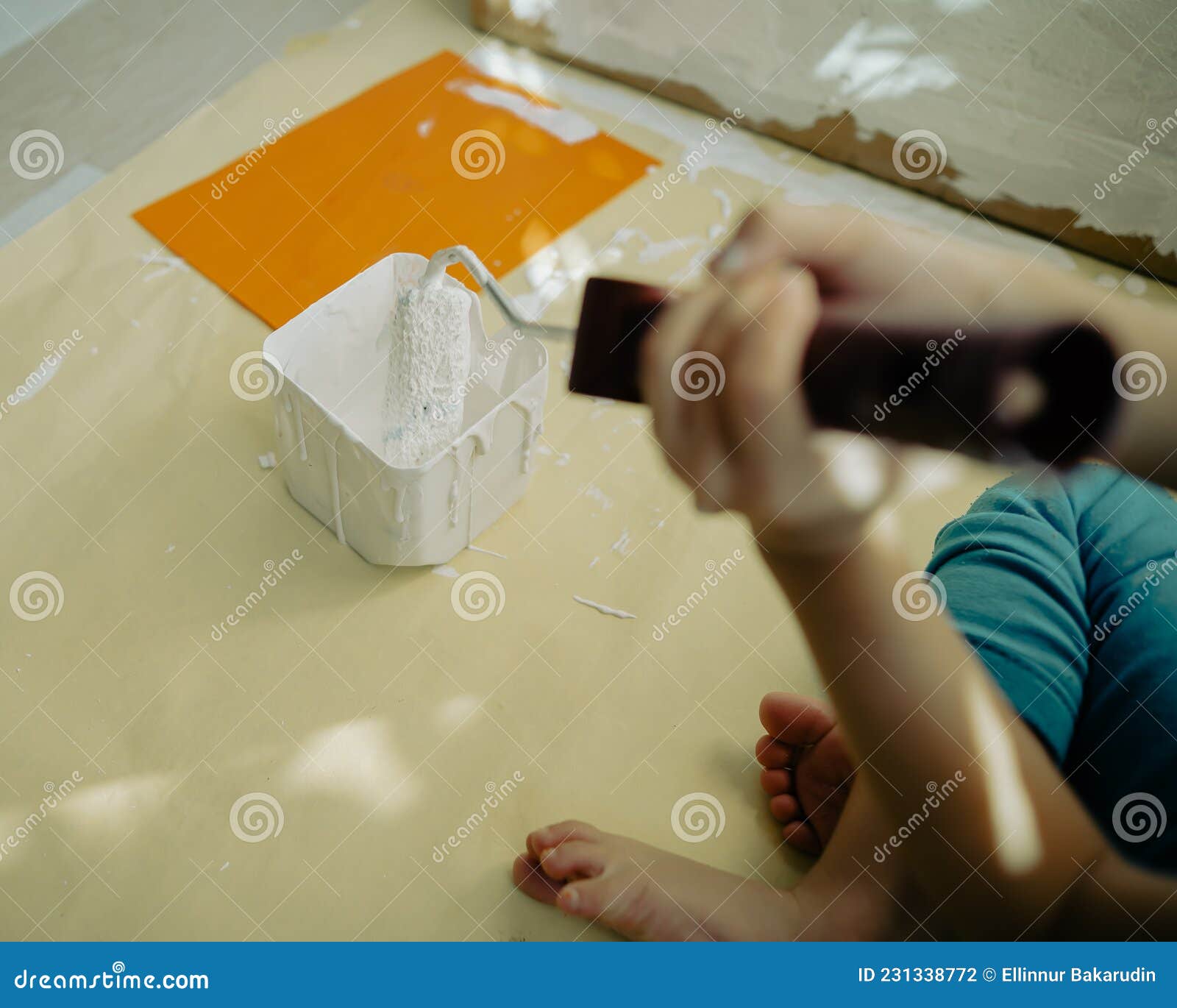 Dipping Roller Paint into the Paint Container Stock Photo - Image of ...