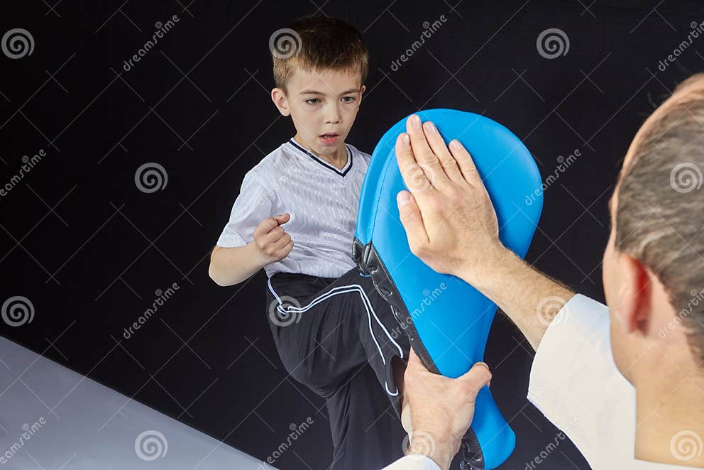 Direct Kick Small Athlete is Beating on the Simulator Stock Photo ...