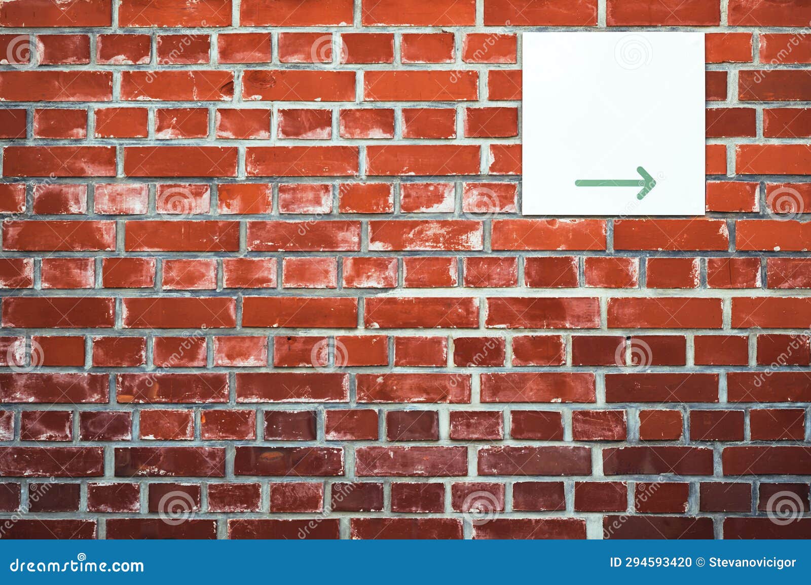 Direction Arrow Sign Board on Brick Wall Facade Stock Photo - Image of ...