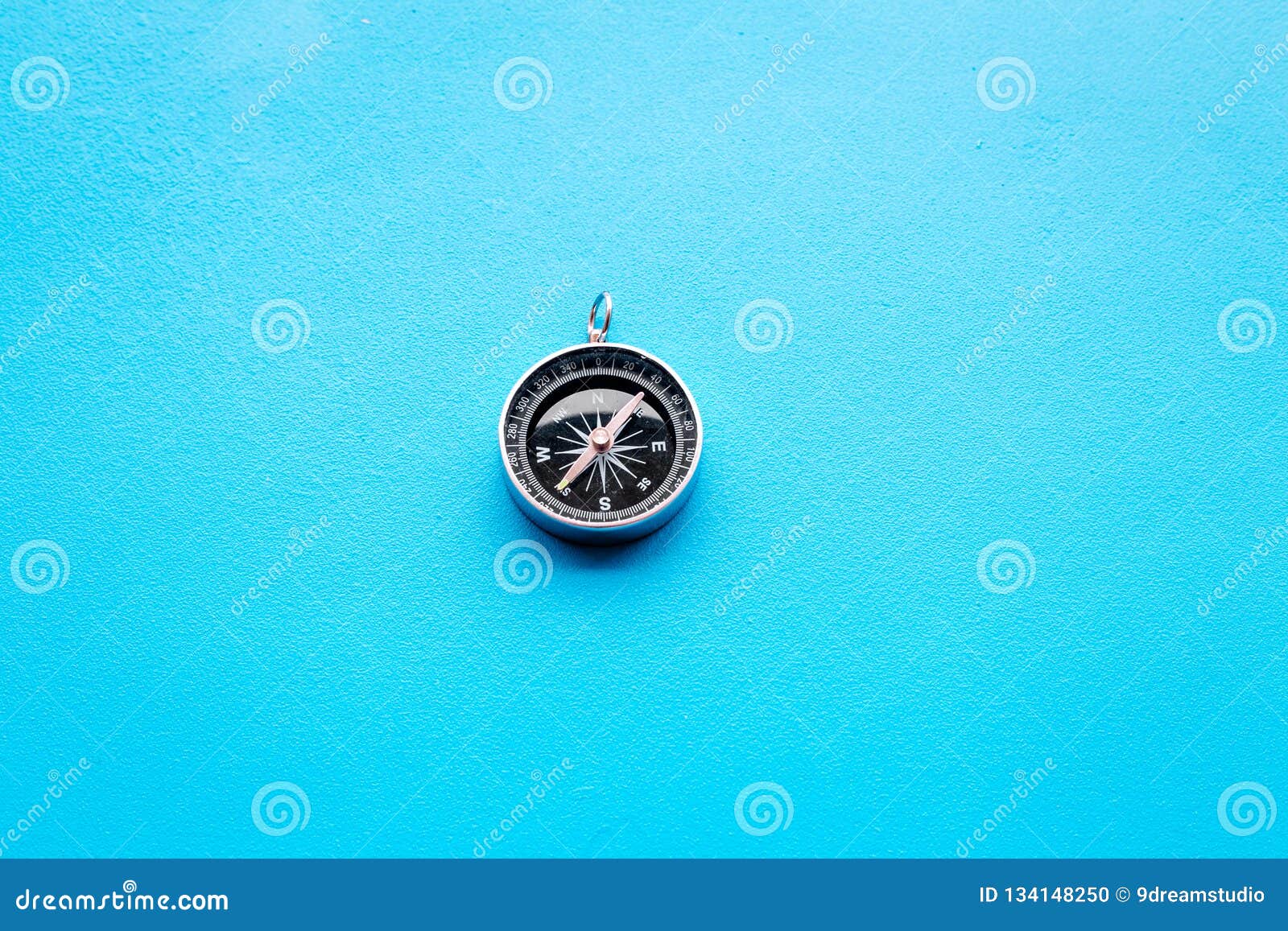 Direction Concept with Compass on Blue Background Top View Mockup Stock ...