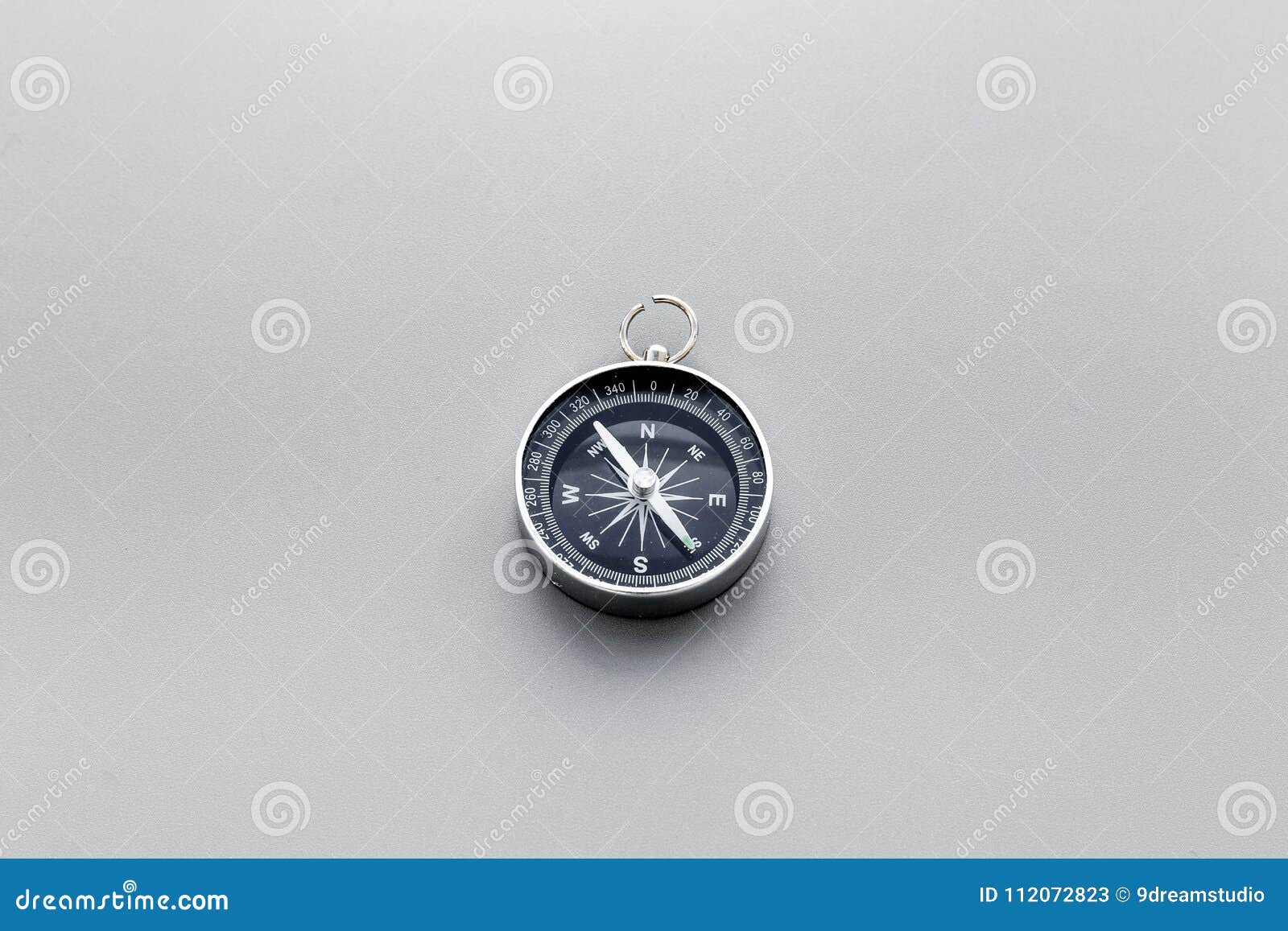 Direction Concept with Compass on Gray Background Top View Mockup Stock ...