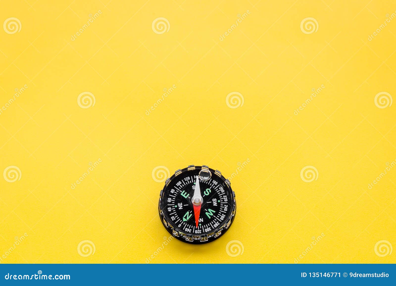 Direction Concept with Compass on Yellow Background Top View Space for ...