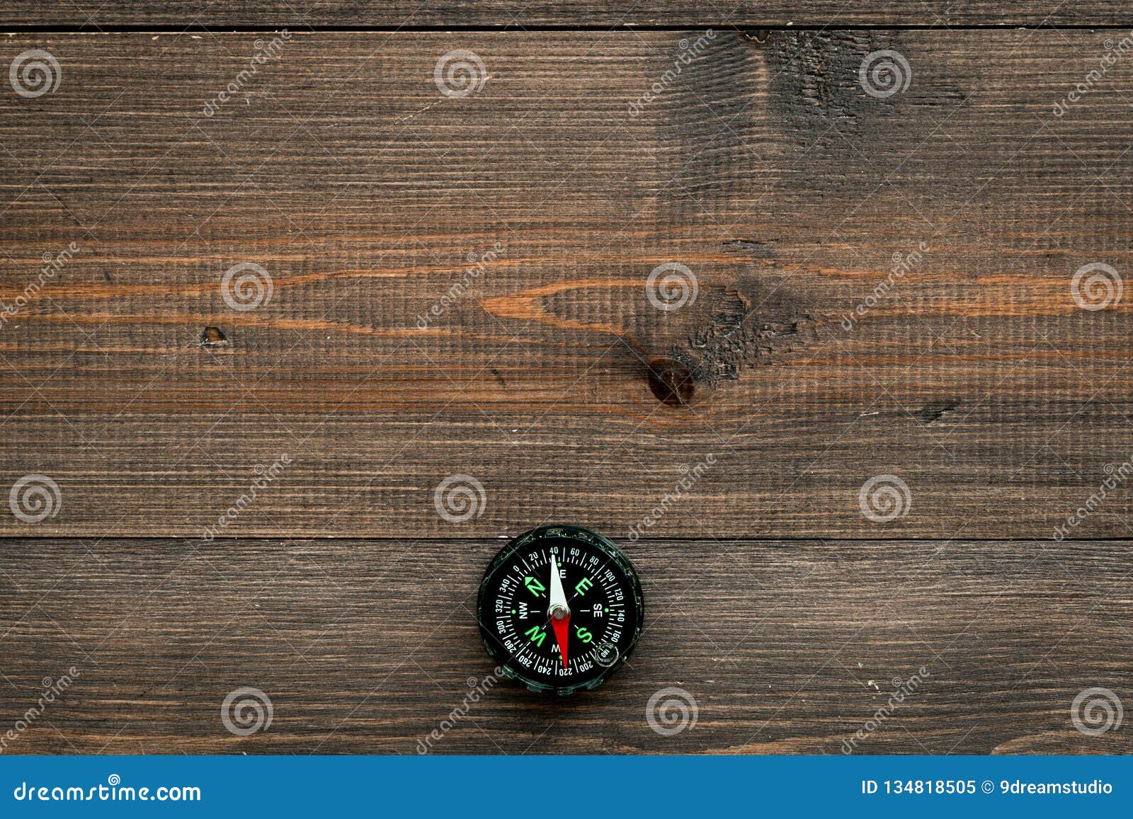 Direction of Movement. Compass on Wooden Background Top View Copy Space ...