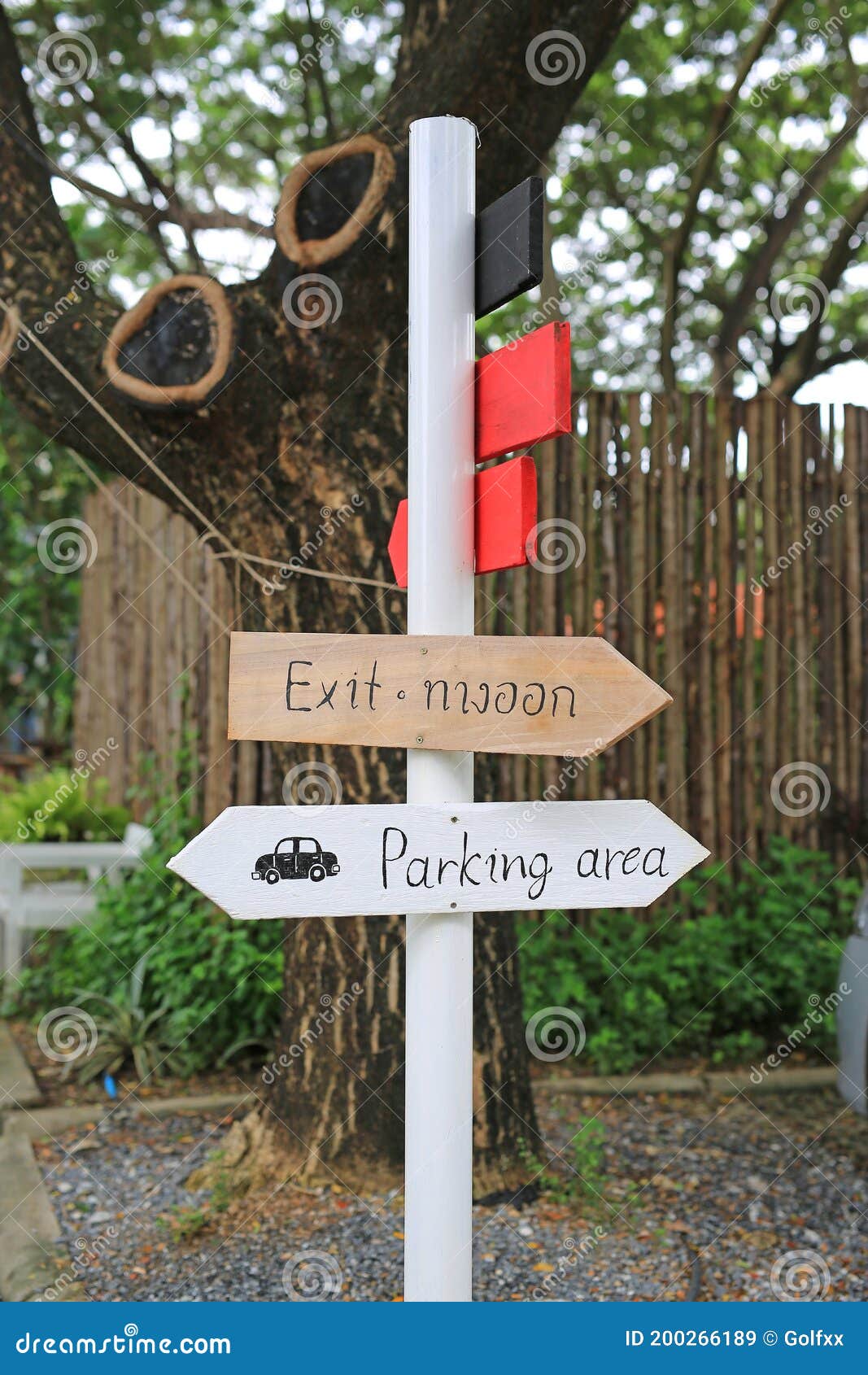 Direction Parking Area Sign on Wooden Panel with Arrow on the Pole ...