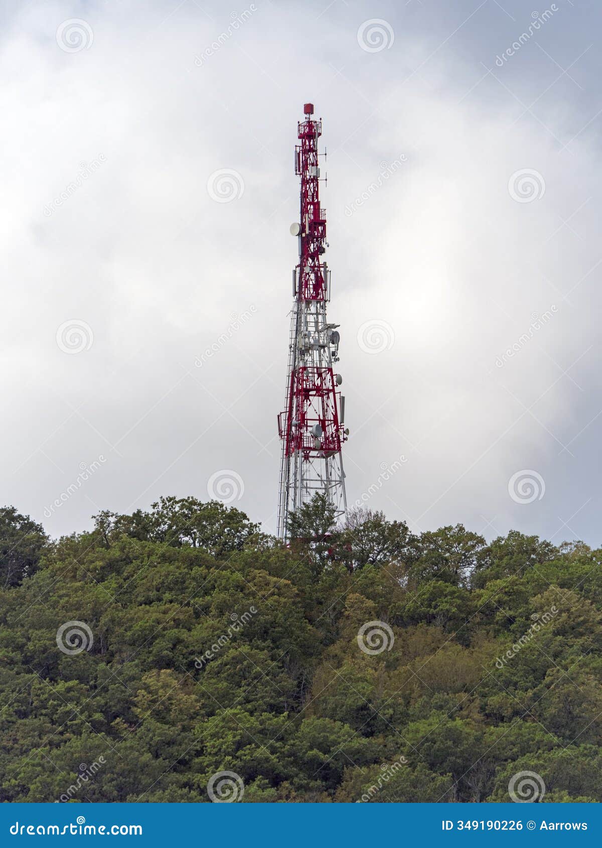 Directional Antenna Array on a Red and White Communication Tower ...