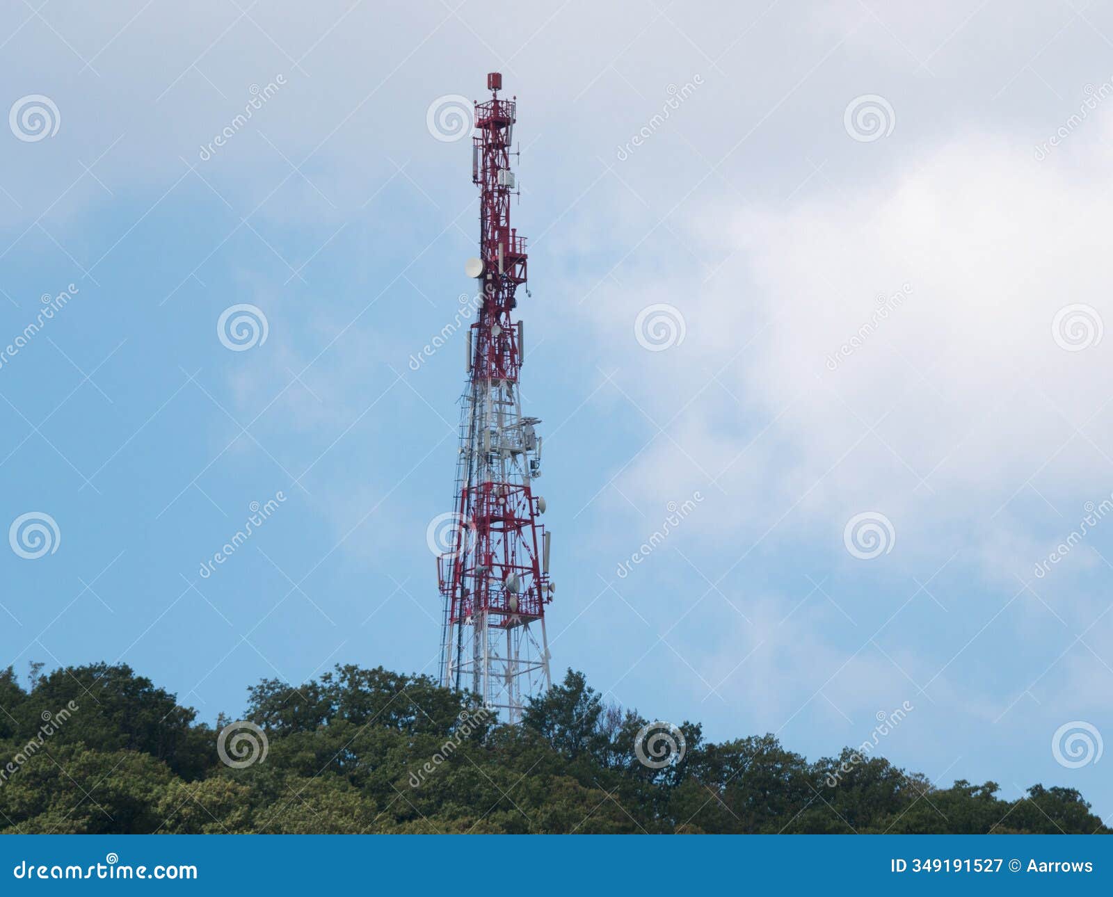 Directional Antenna Array on a Red and White Communication Tower ...