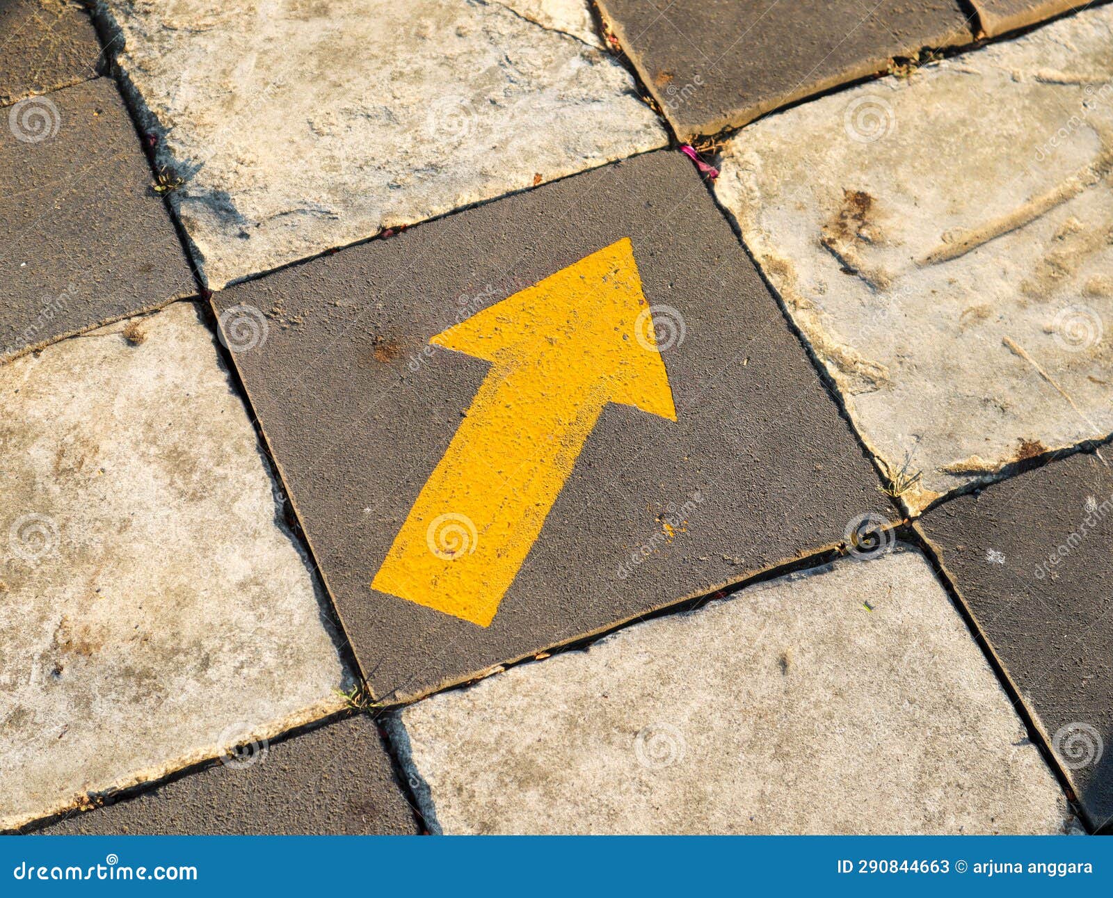 A Directional Arrow on the Sidewalk Stock Image - Image of safety ...