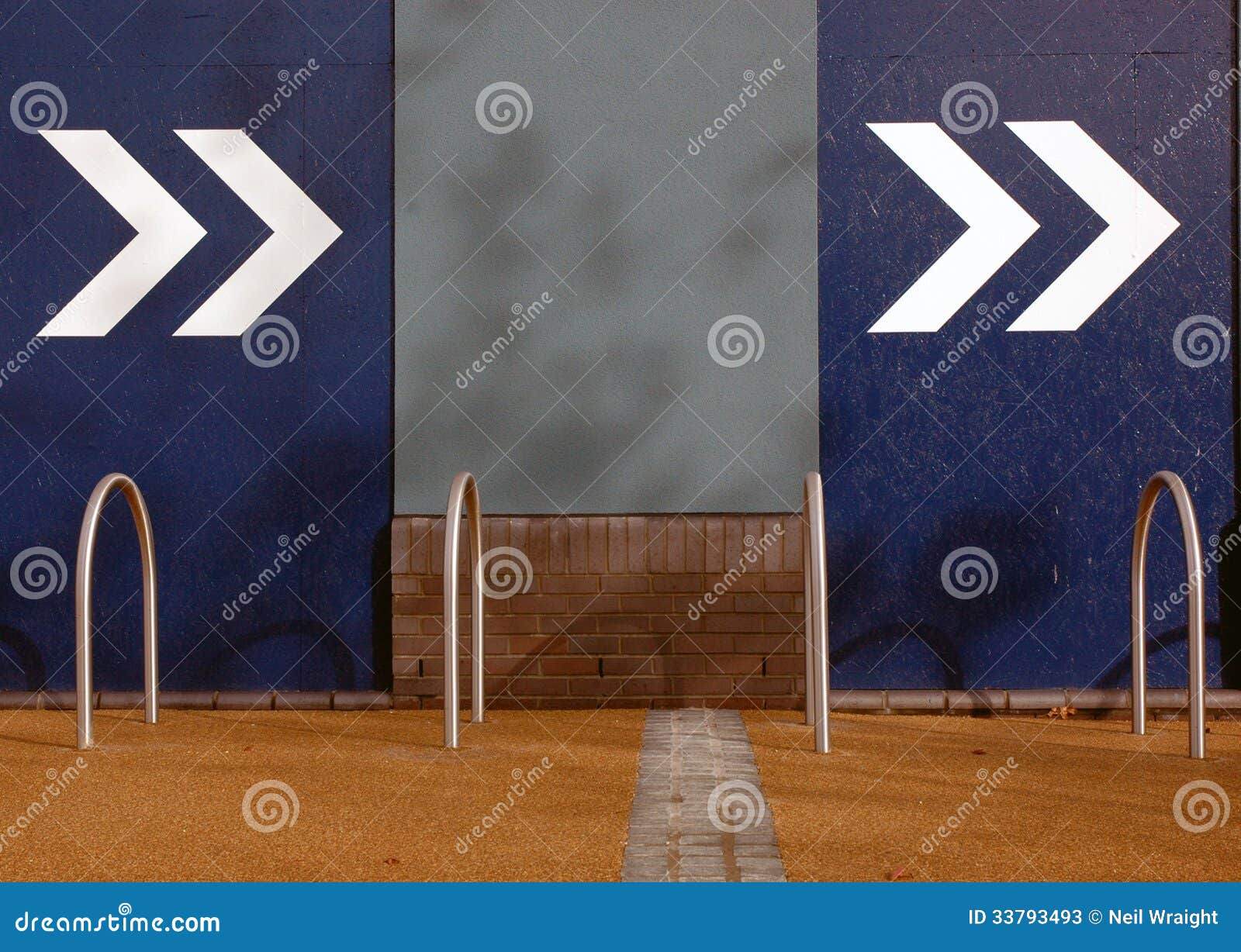 Directional Arrows on a Blue Coloured Wall Stock Image - Image of point ...