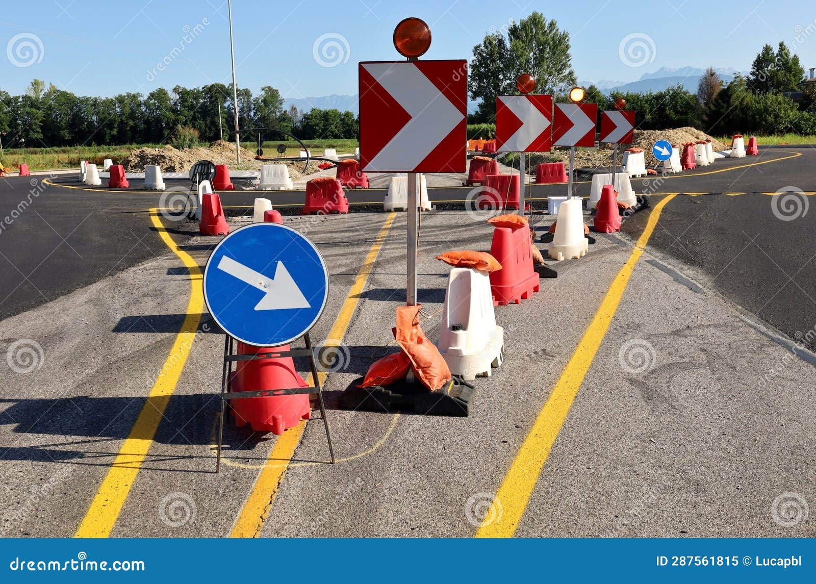 Row Of Warning And Directional Road Signs Marking Start Of Road ...
