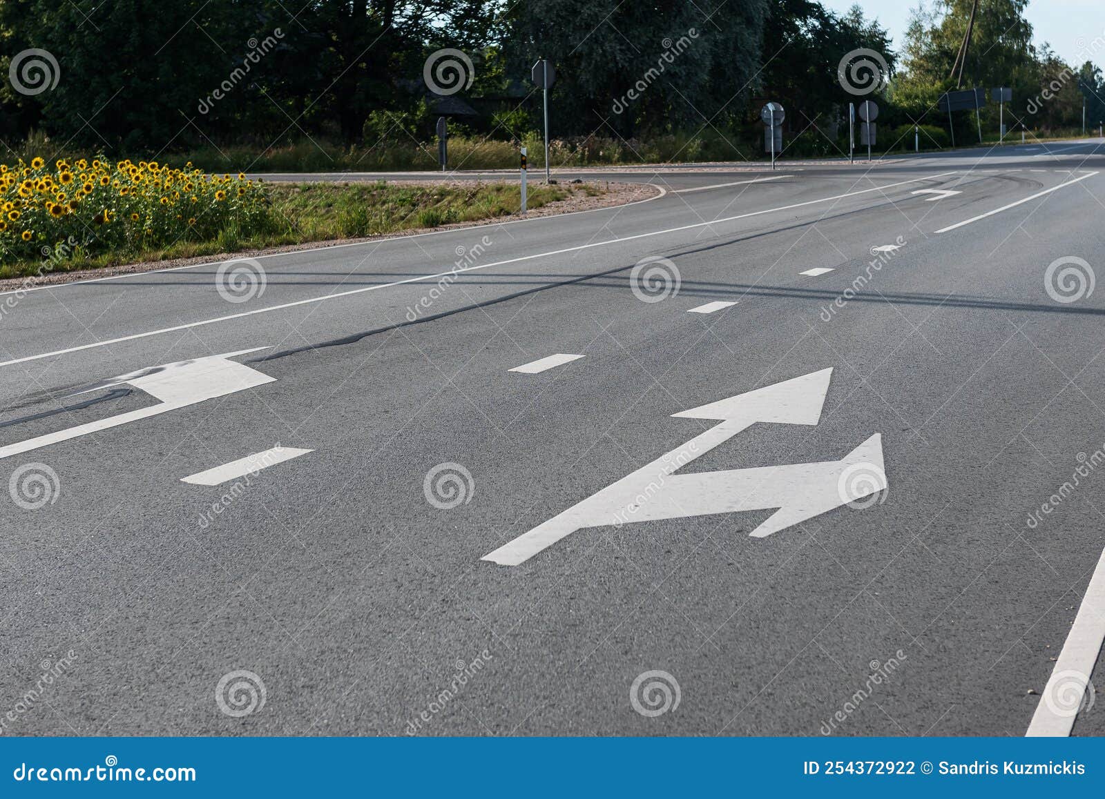 Directional Signs with Arrows on Asphalt Road Stock Photo - Image of ...