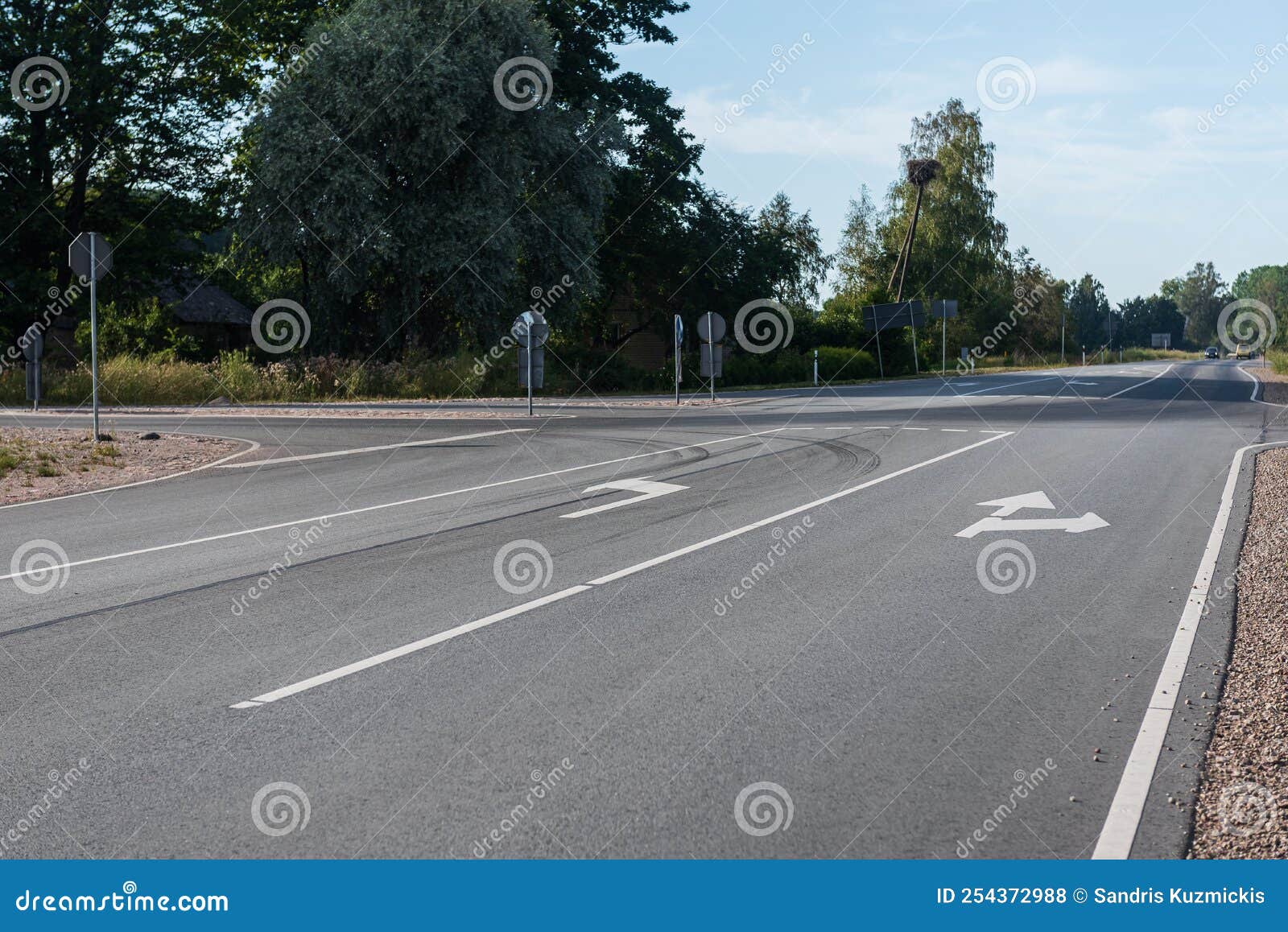 Directional Signs with Arrows on Asphalt Road Stock Photo - Image of ...