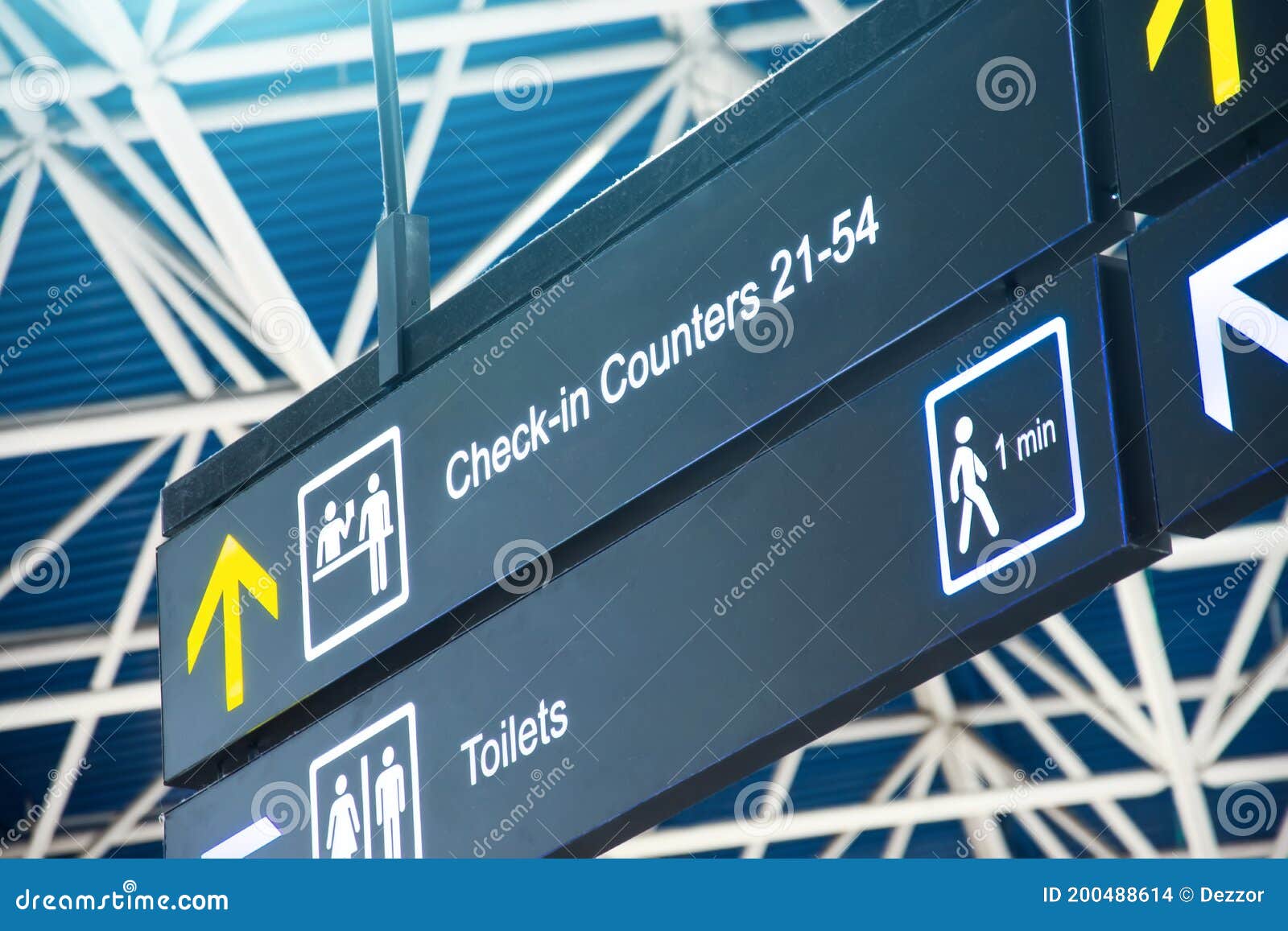 Directions on the Sign at the Airport - Check in Counters and Toilets ...