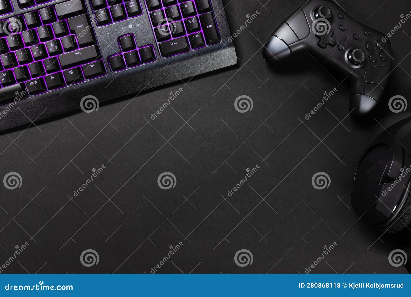 Purple Lit Keyboard by Game Controller and Mouse Stock Photo - Image of ...