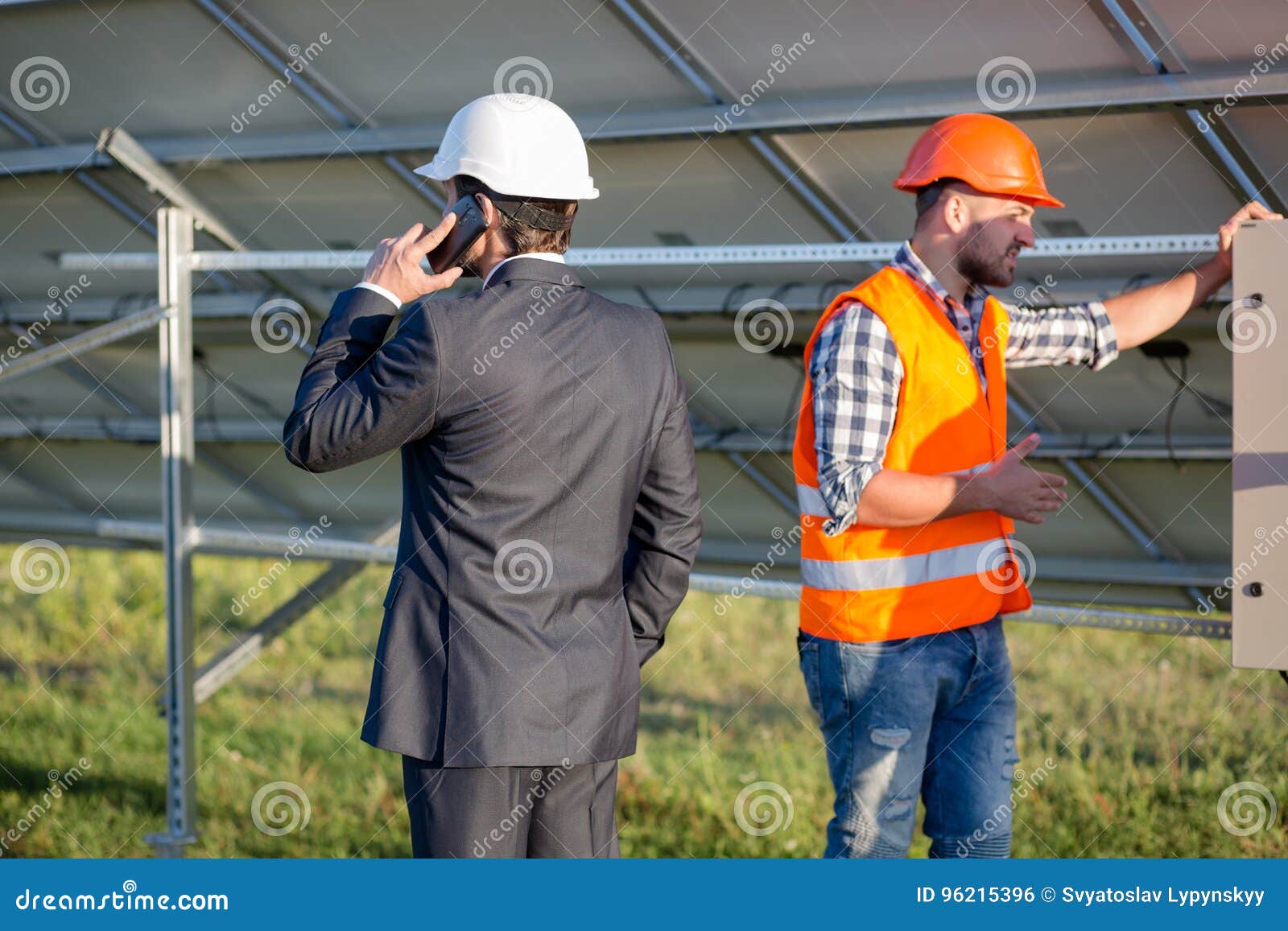 Engineer In Solar Power Plant Working On Installing Solar Panel ; Smart ...