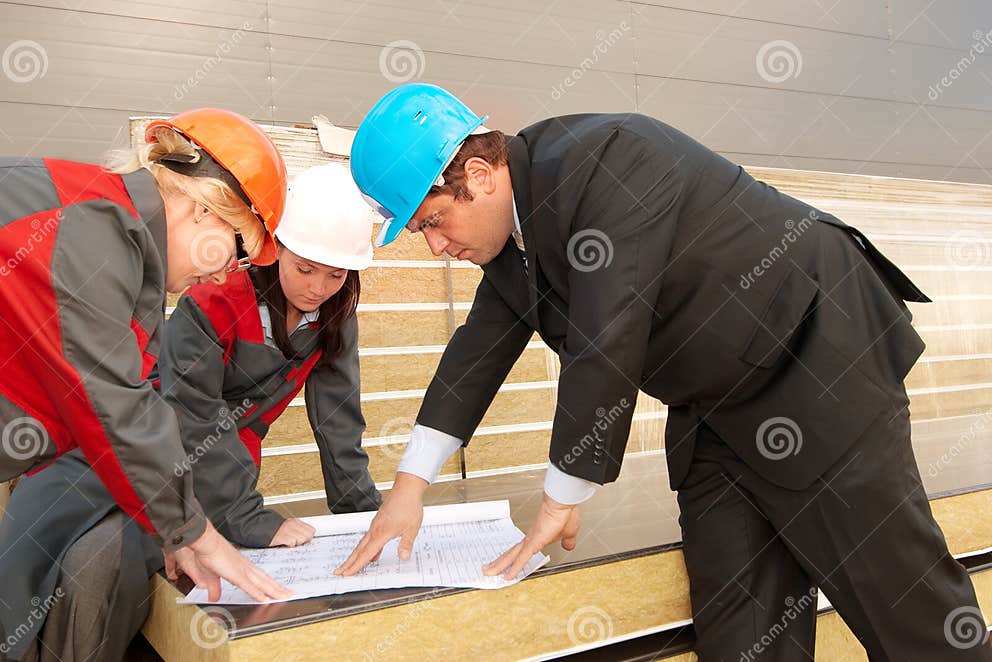 Director with Subordinates on Construction Site Stock Image - Image of ...